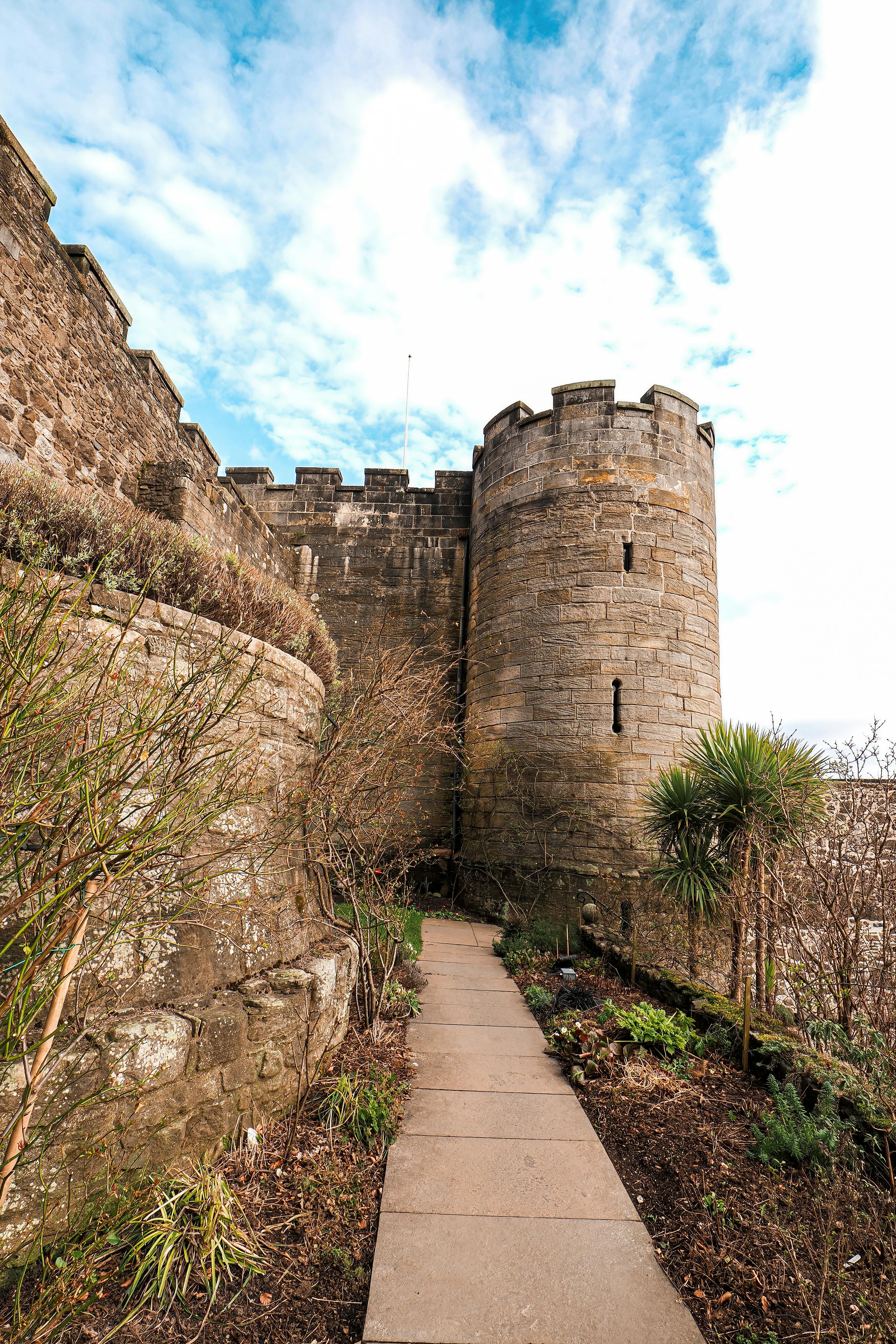 Medieval Stone Castle Tower and Walkway · Free Stock Photo