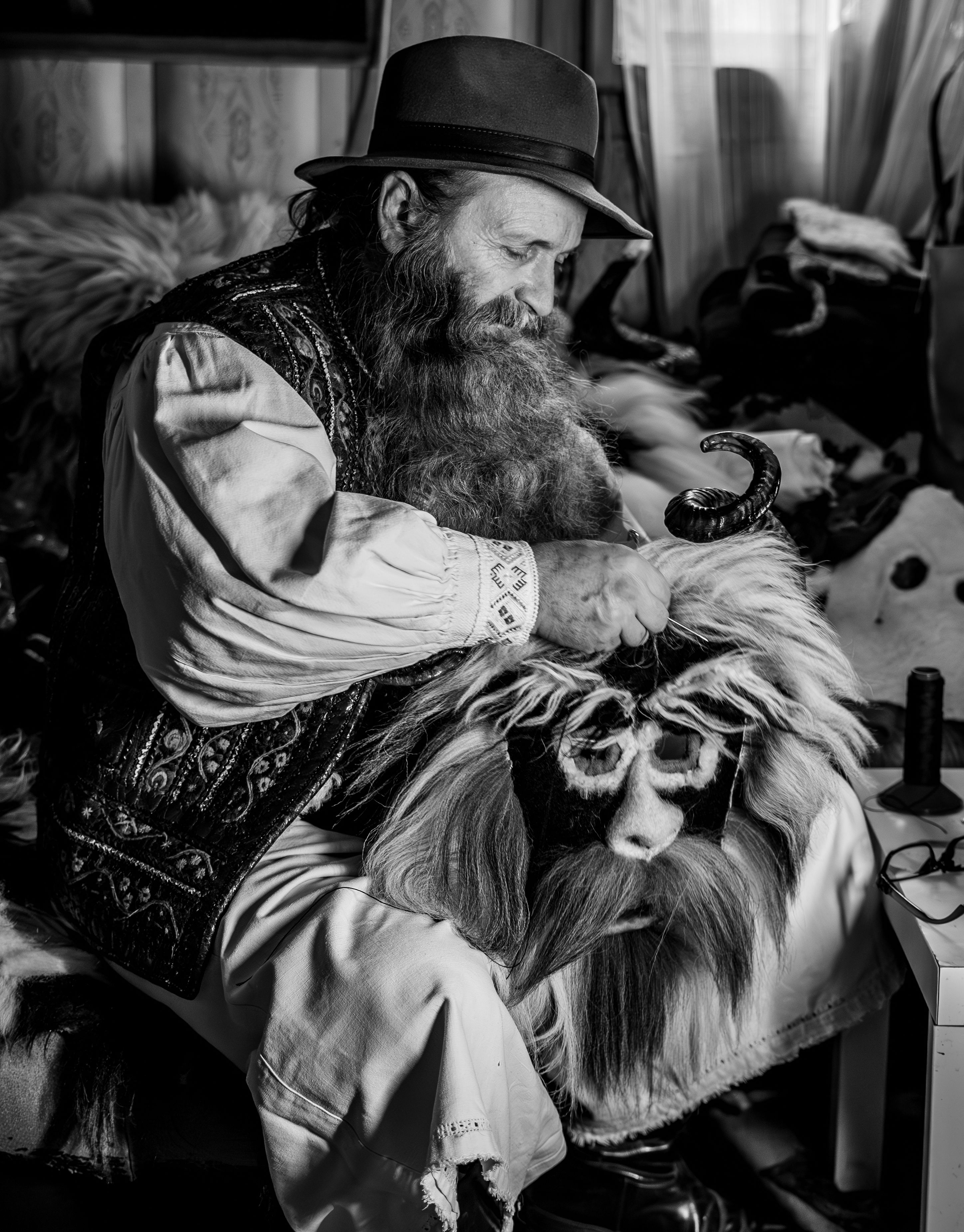 Tradition and Craft: Artisan Creating Folk Mask · Free Stock Photo