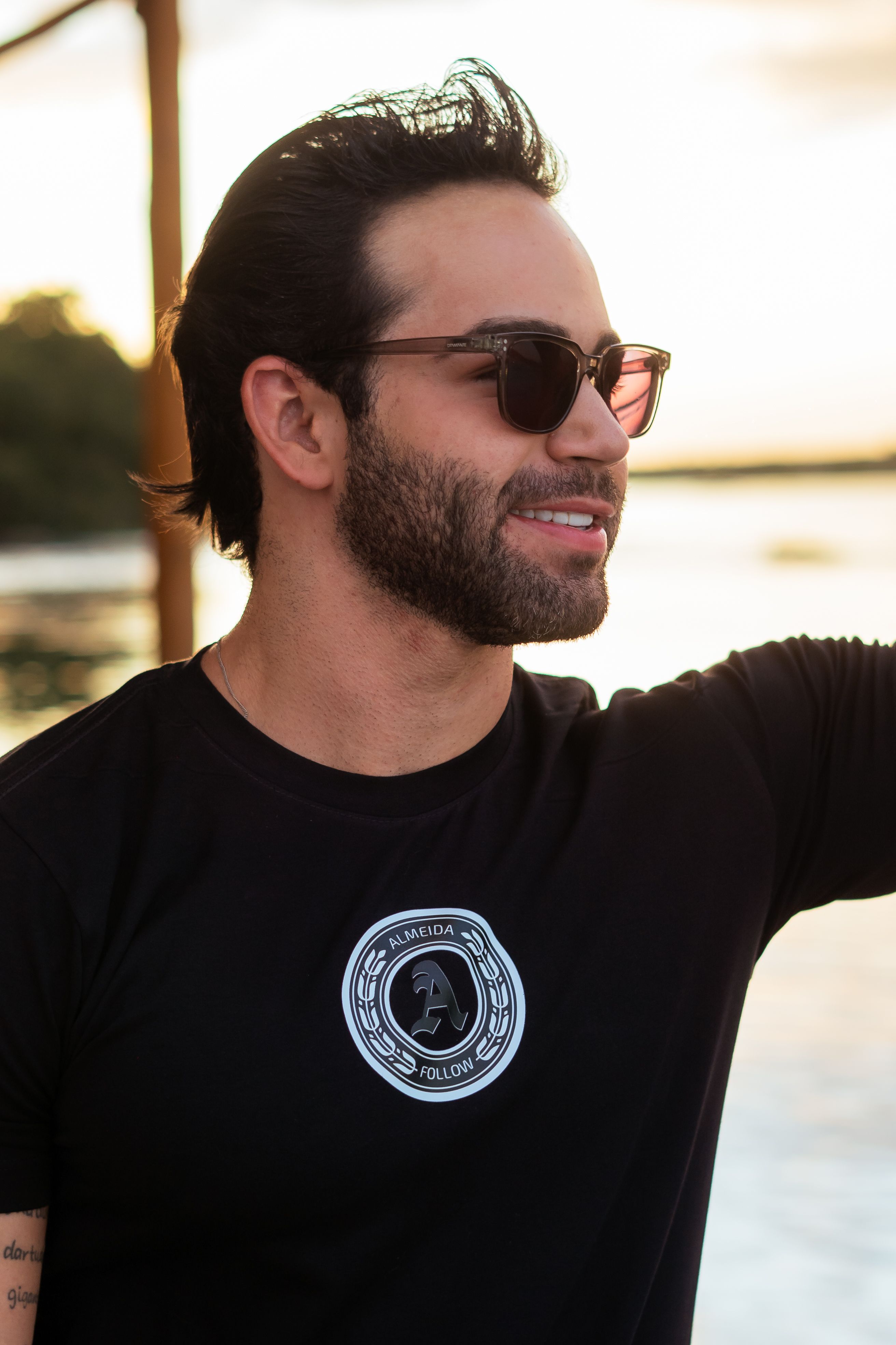 Young Man Posing Outdoors at Sunset · Free Stock Photo