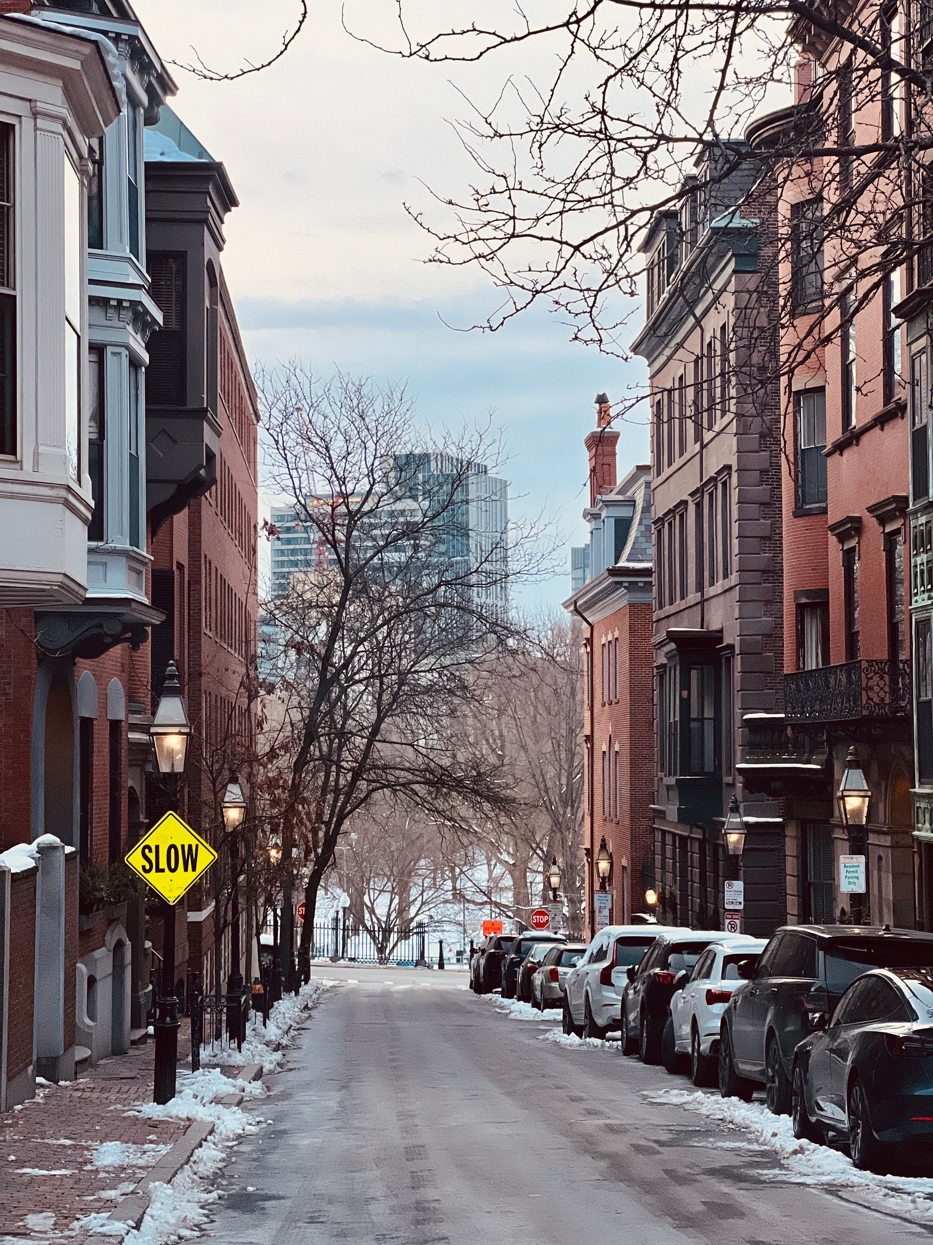 Snowy Urban Street in Winter with Cityscape · Free Stock Photo