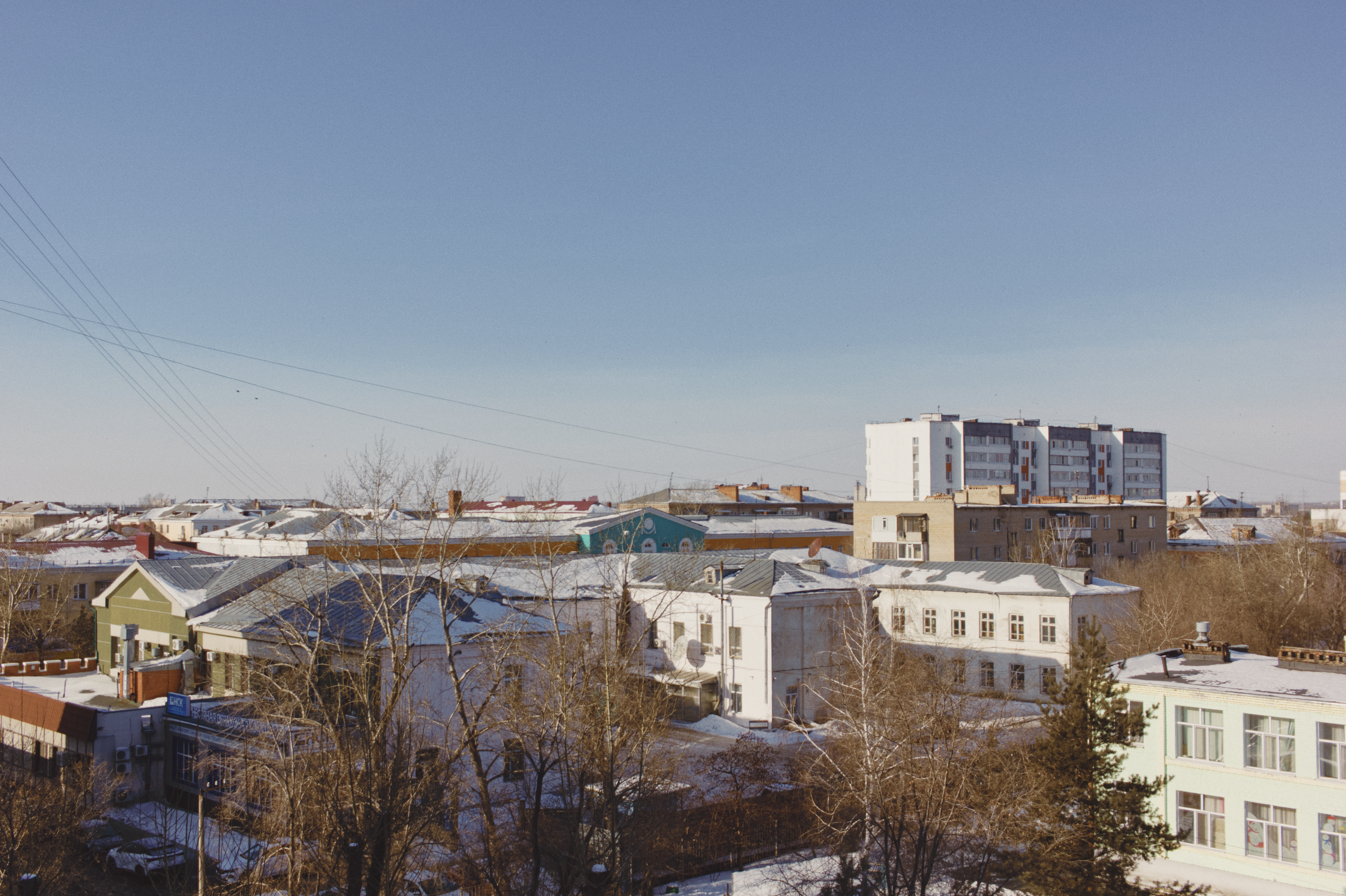 Winter Urban Landscape with Snowy Rooftops · Free Stock Photo