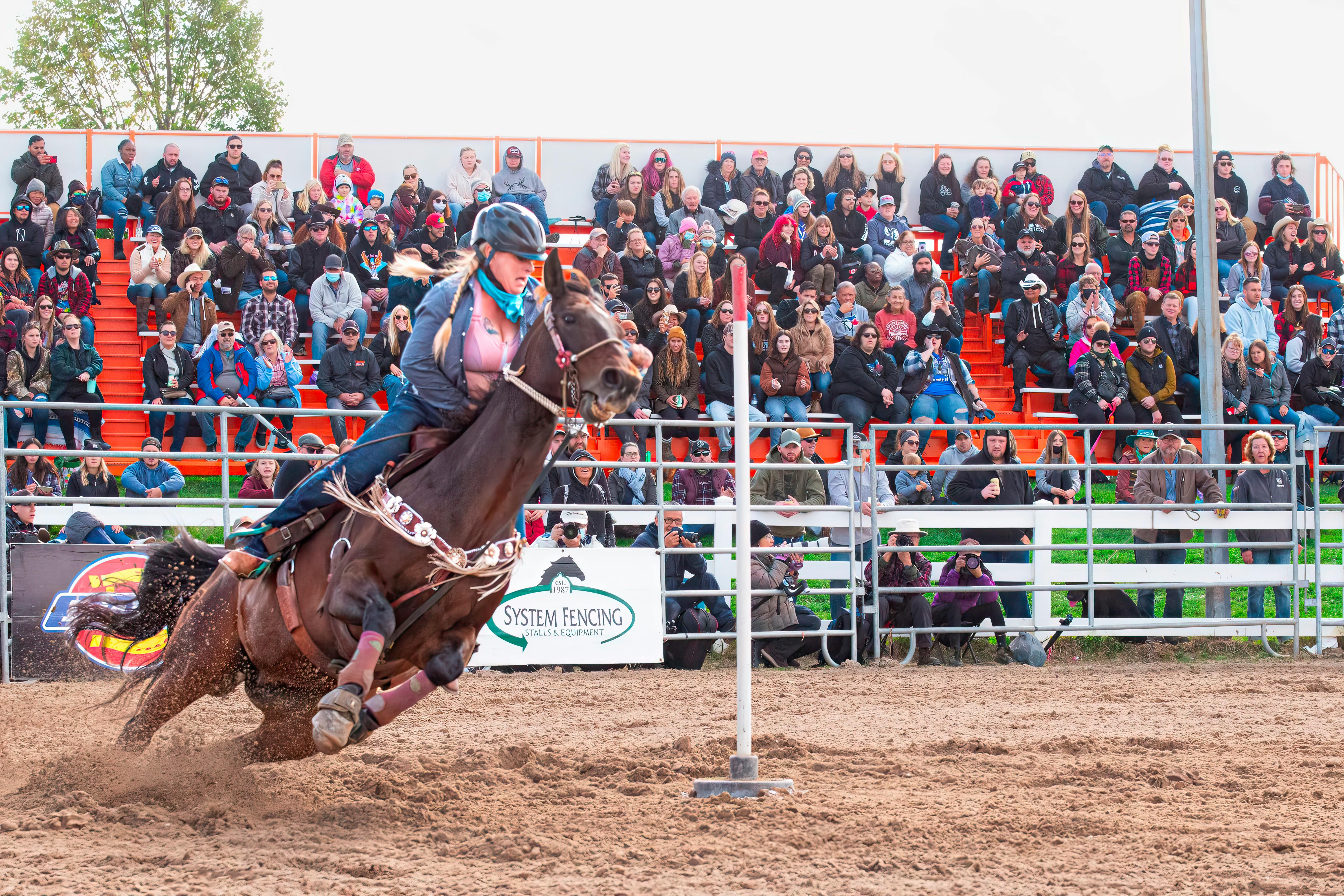 Exciting Barrel Racing Competition at Rodeo · Free Stock Photo