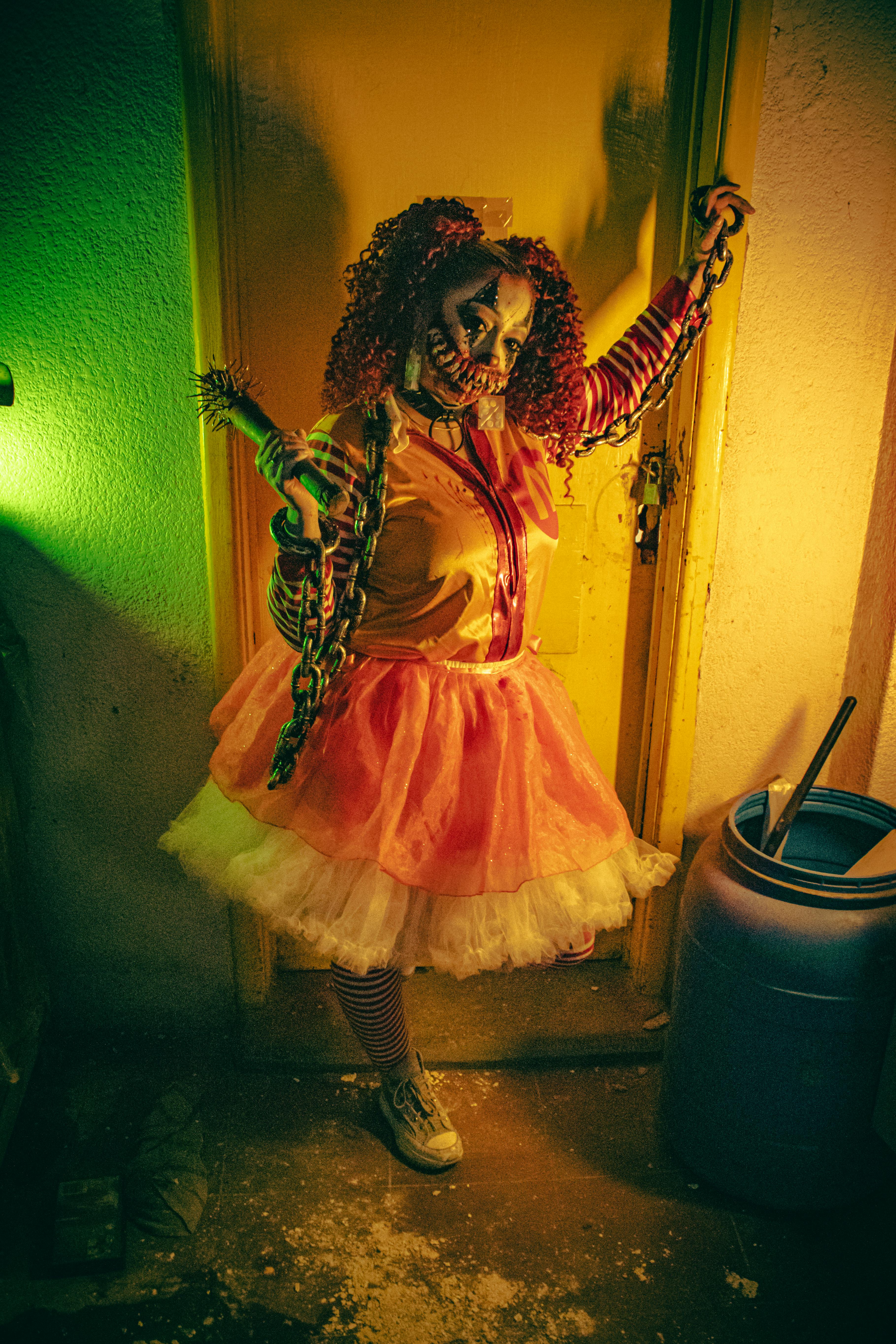 Vibrant Cosplay Clown with Artistic Makeup · Free Stock Photo