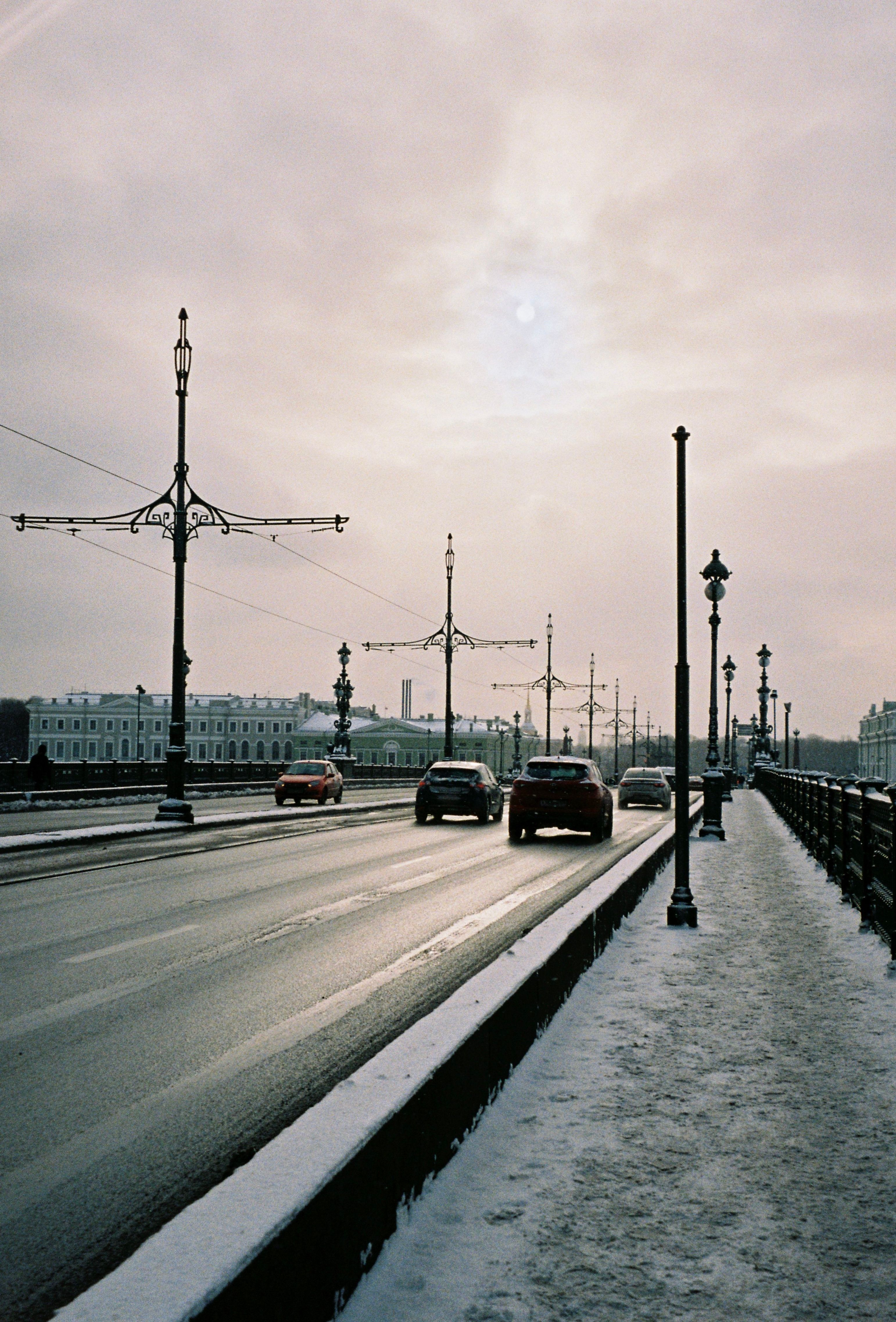Winter City Bridge Scene with Snow and Cars · Free Stock Photo