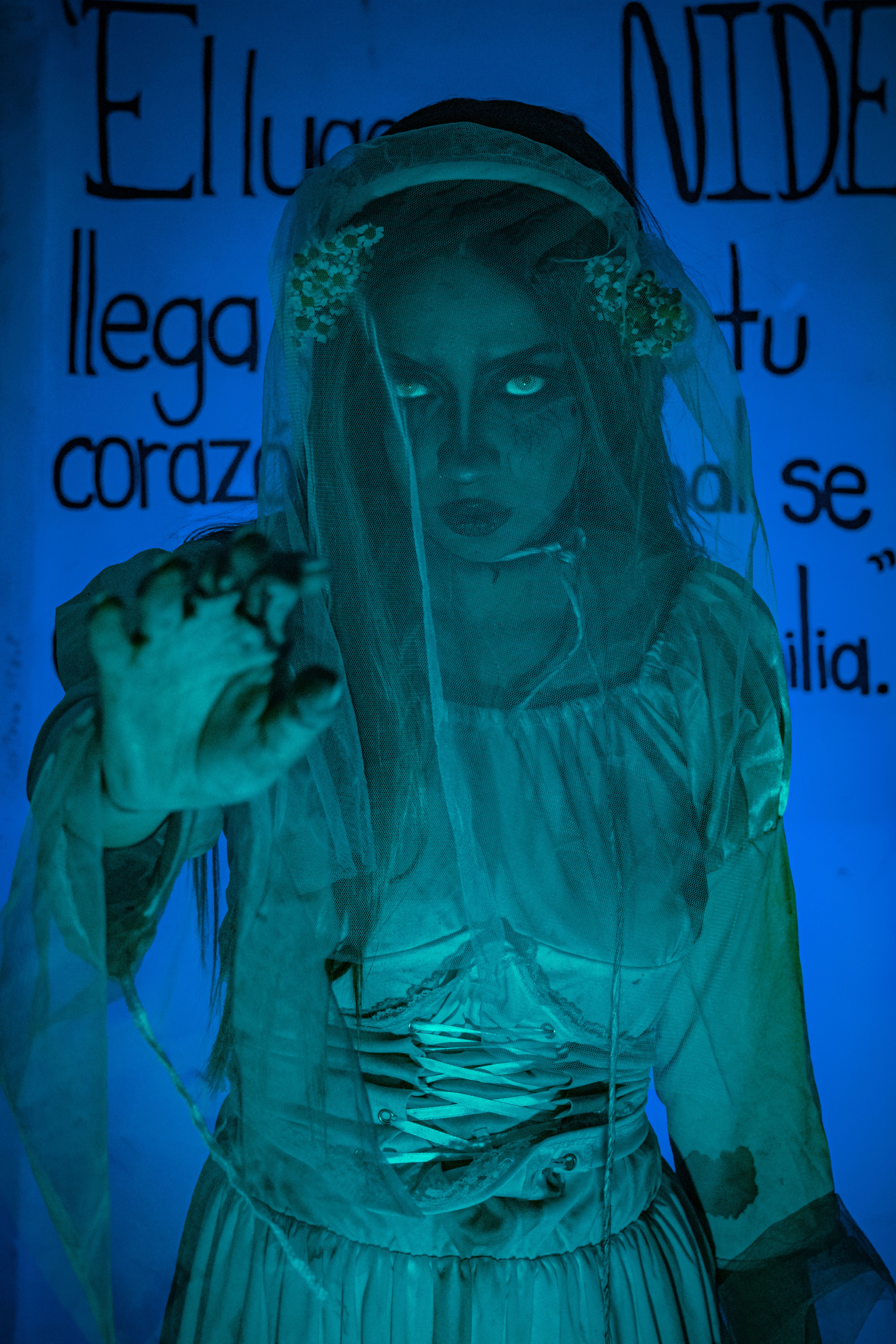 Eerie Cosplay Bride in Blue Light · Free Stock Photo