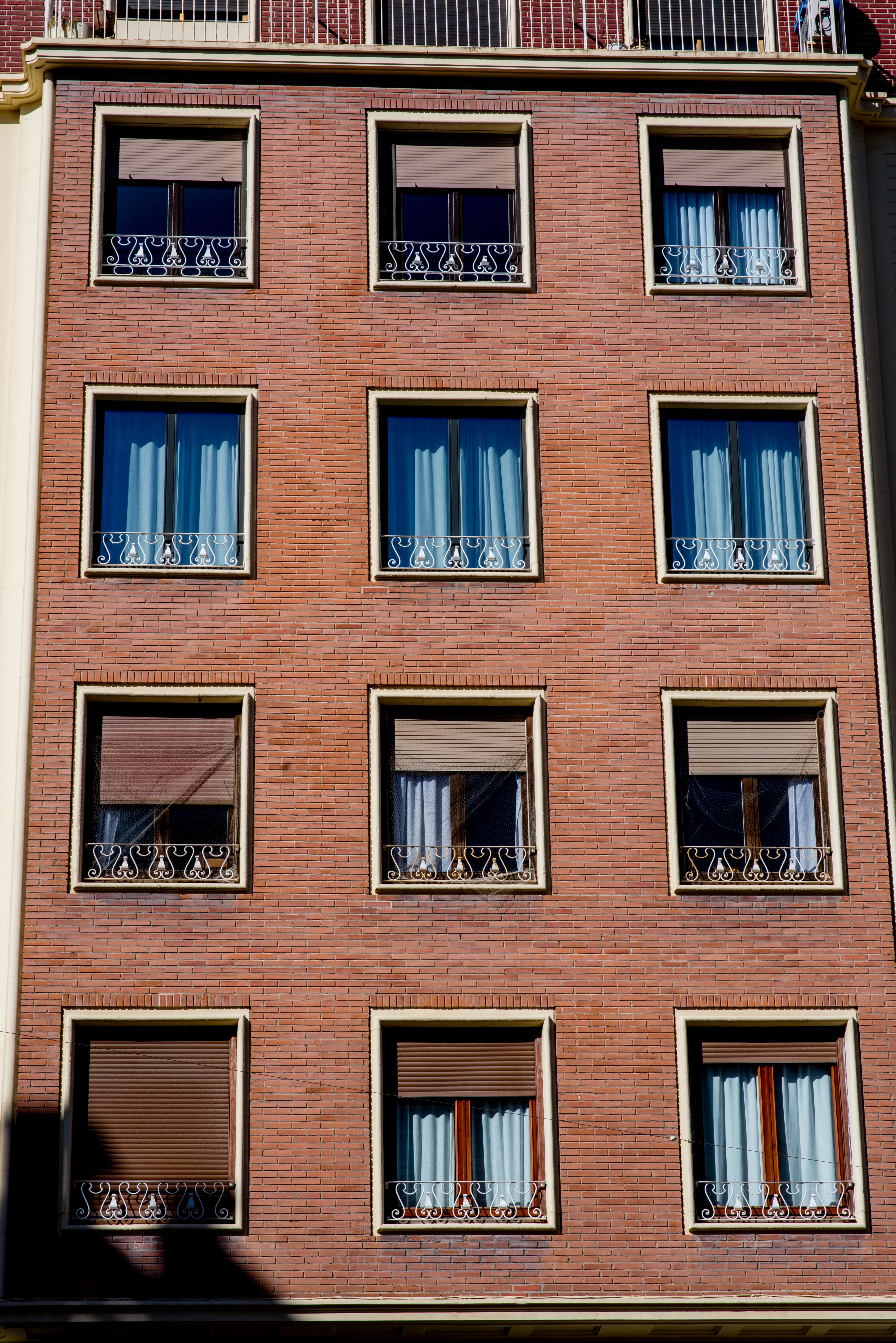 Symmetrical Facade of Urban Brick Building · Free Stock Photo