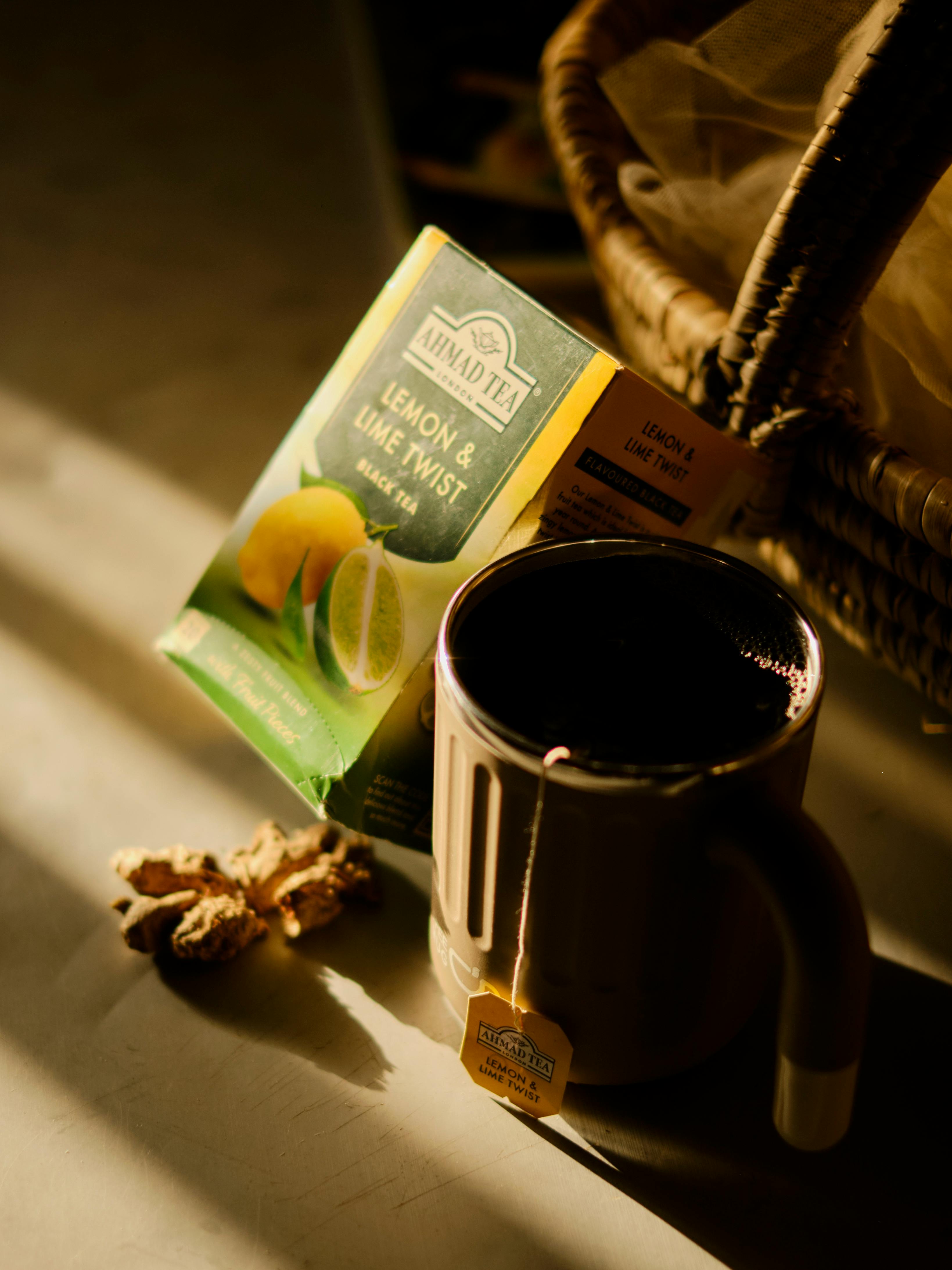 Warm Morning Tea Scene with Lemon & Lime Twist · Free Stock Photo
