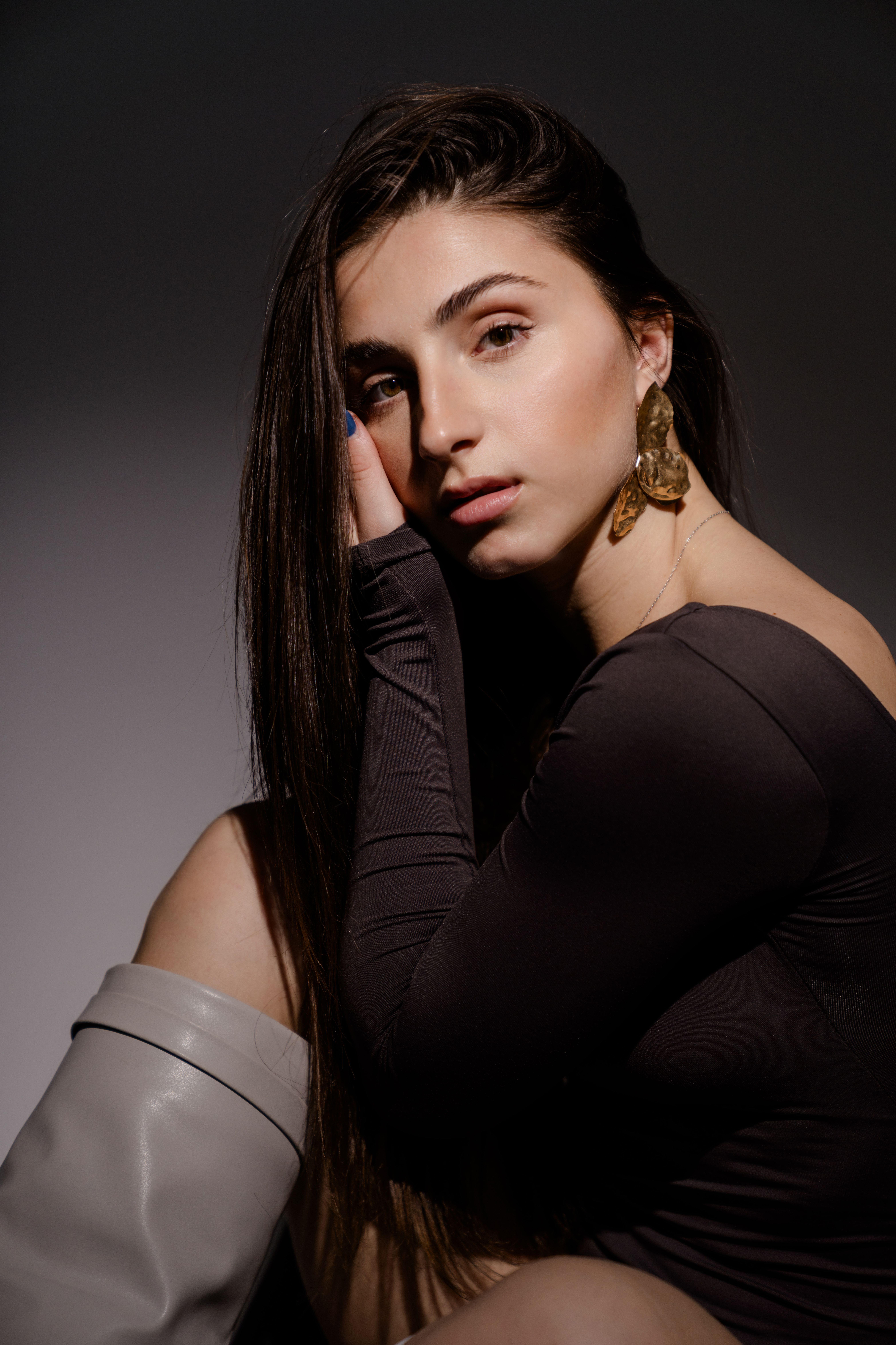 Elegant Woman in Dramatic Lighting Portrait · Free Stock Photo
