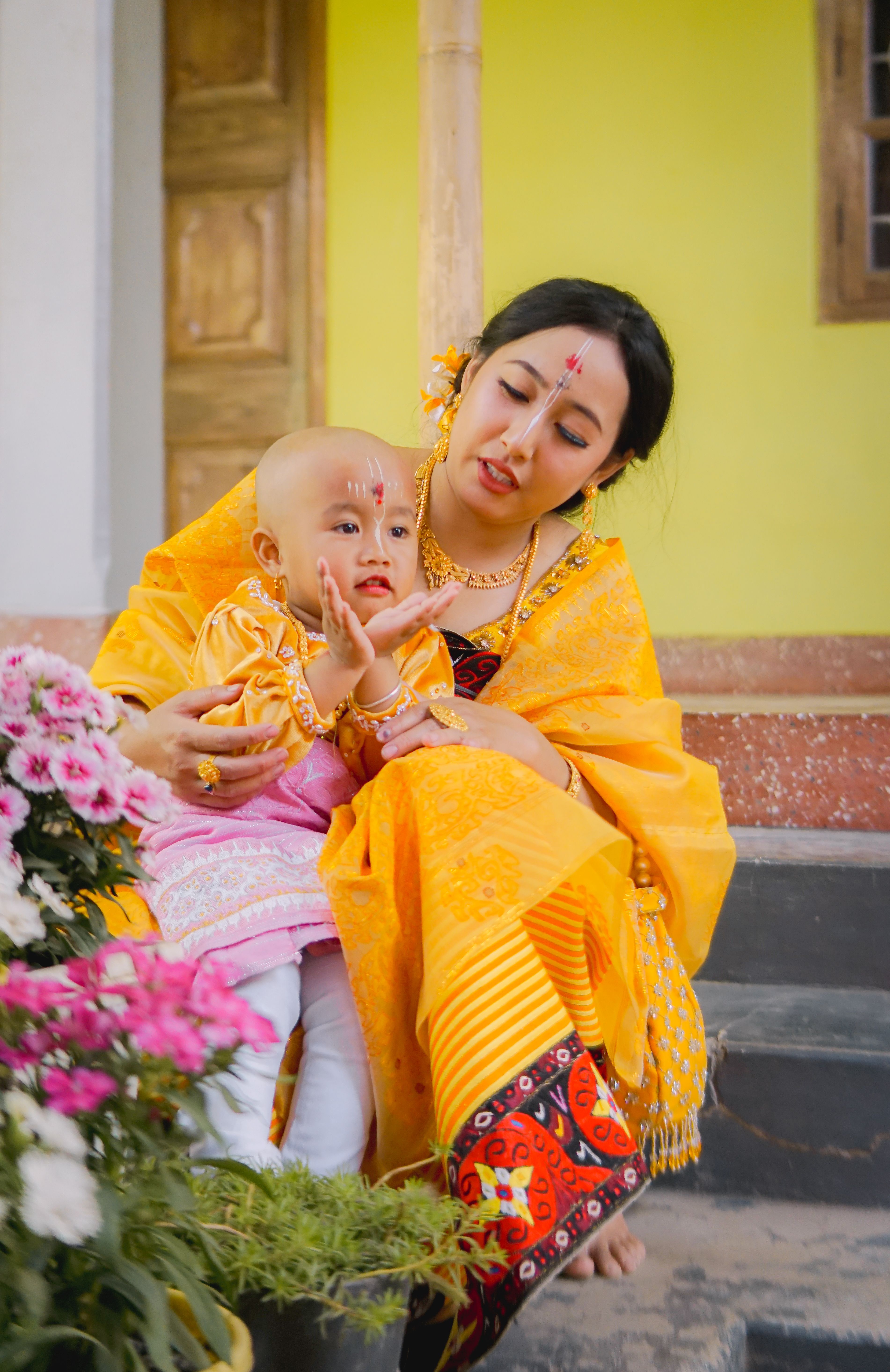 Mother and Child in Traditional Indian Attire · Free Stock Photo