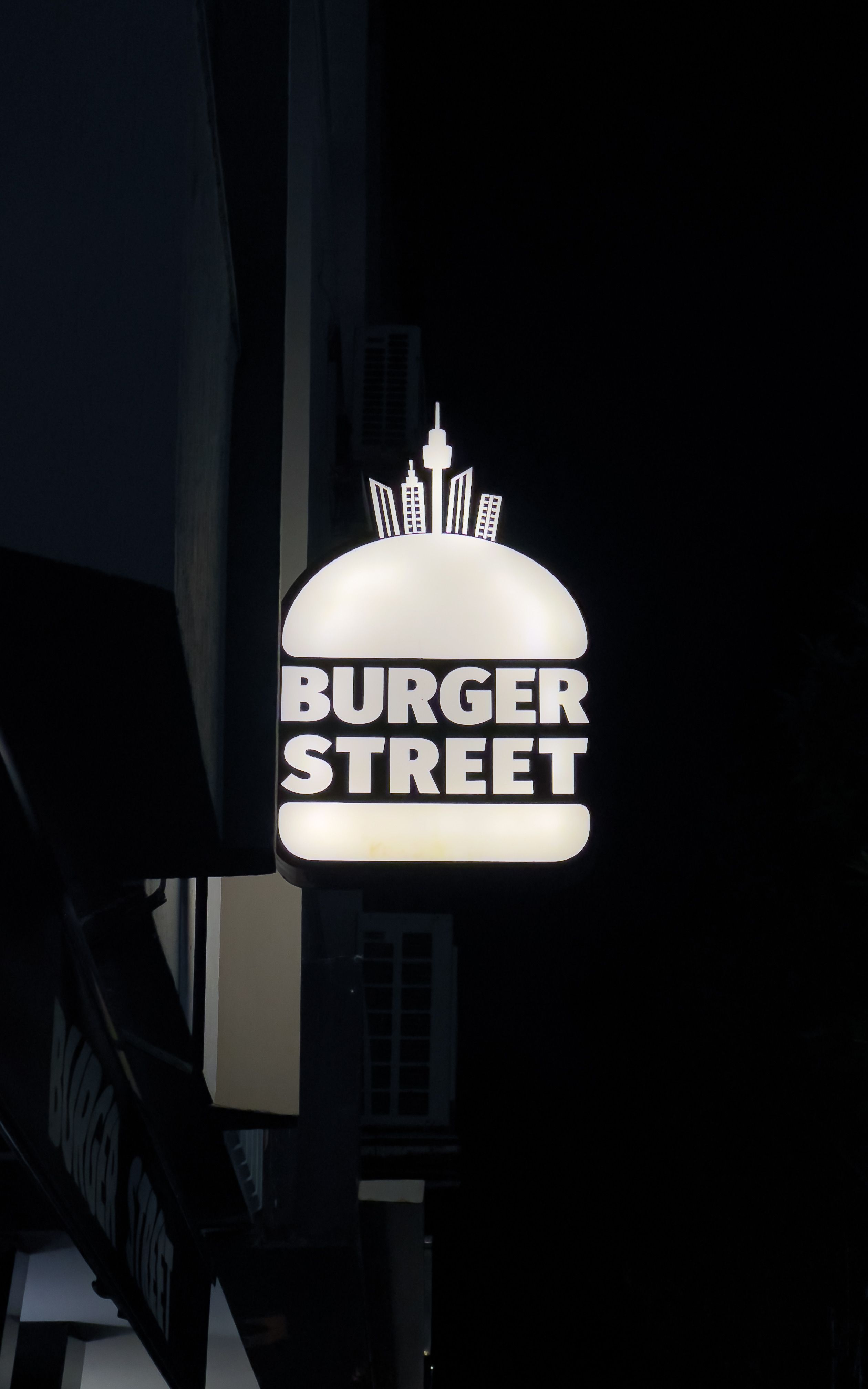 Illuminated Burger Street Sign at Night · Free Stock Photo