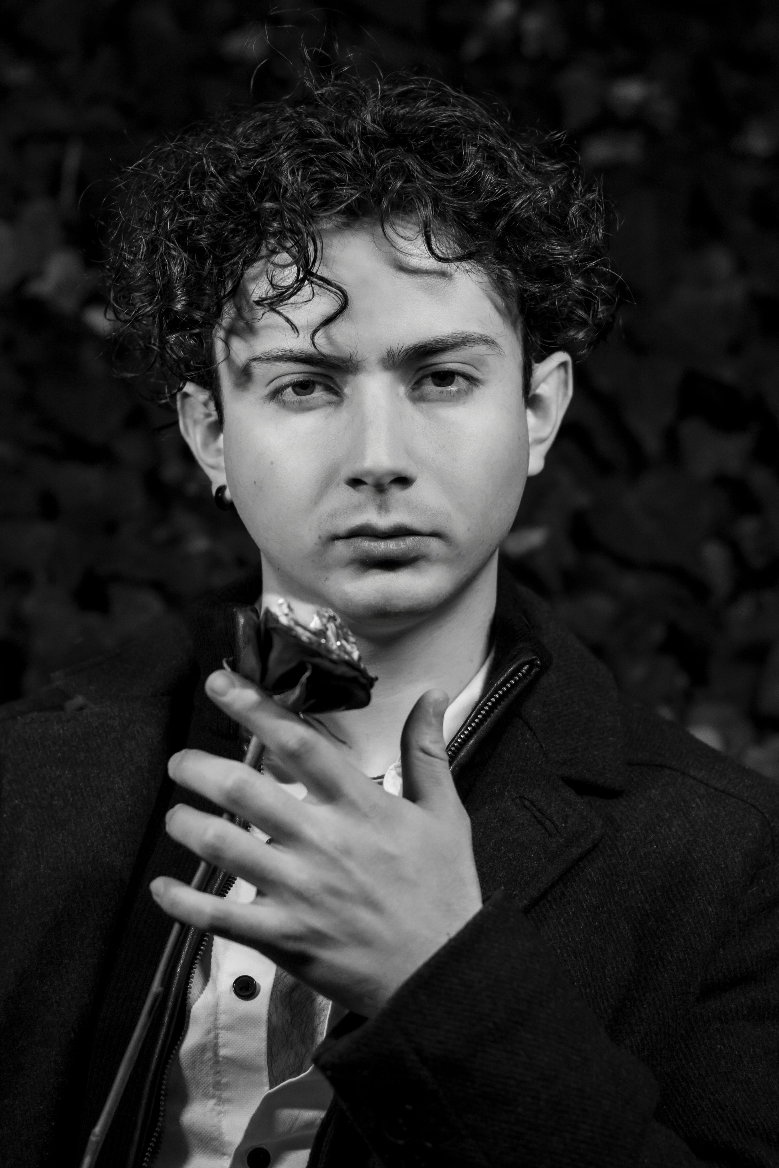 Black and White Portrait of Man with Rose · Free Stock Photo