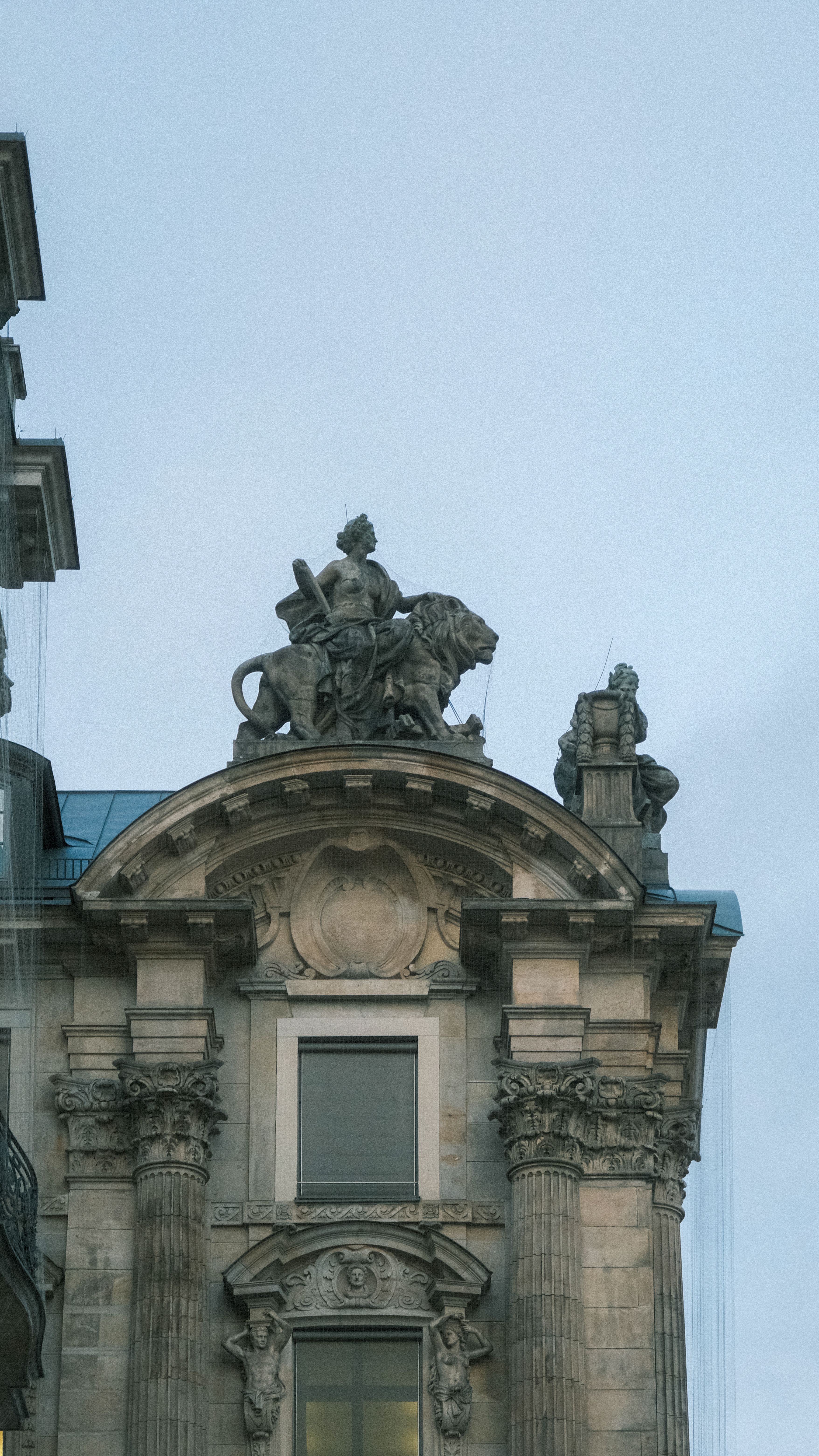 Architectural Sculpture on Historic Building Facade · Free Stock Photo