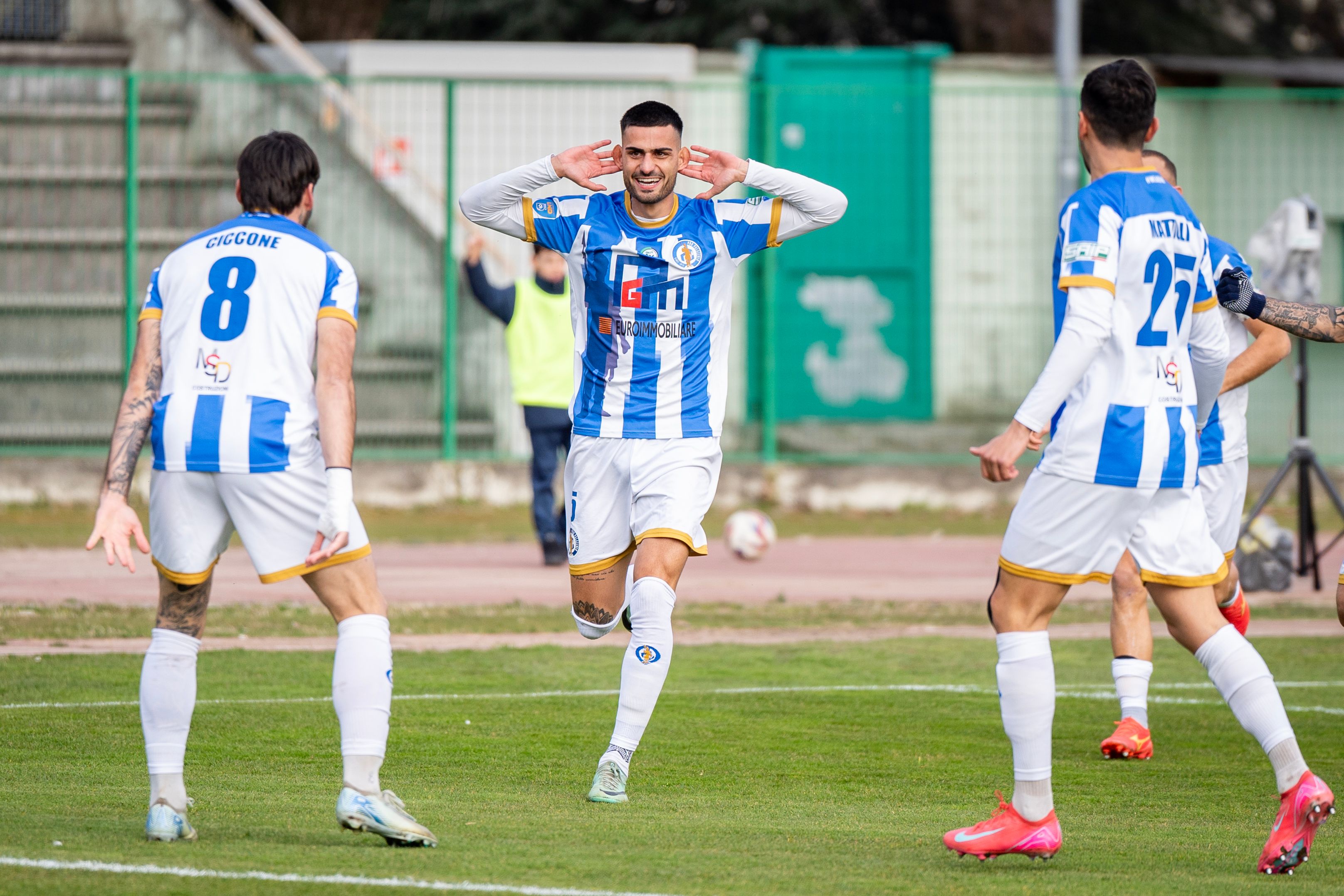 Soccer Players Celebrating Goal on Field · Free Stock Photo