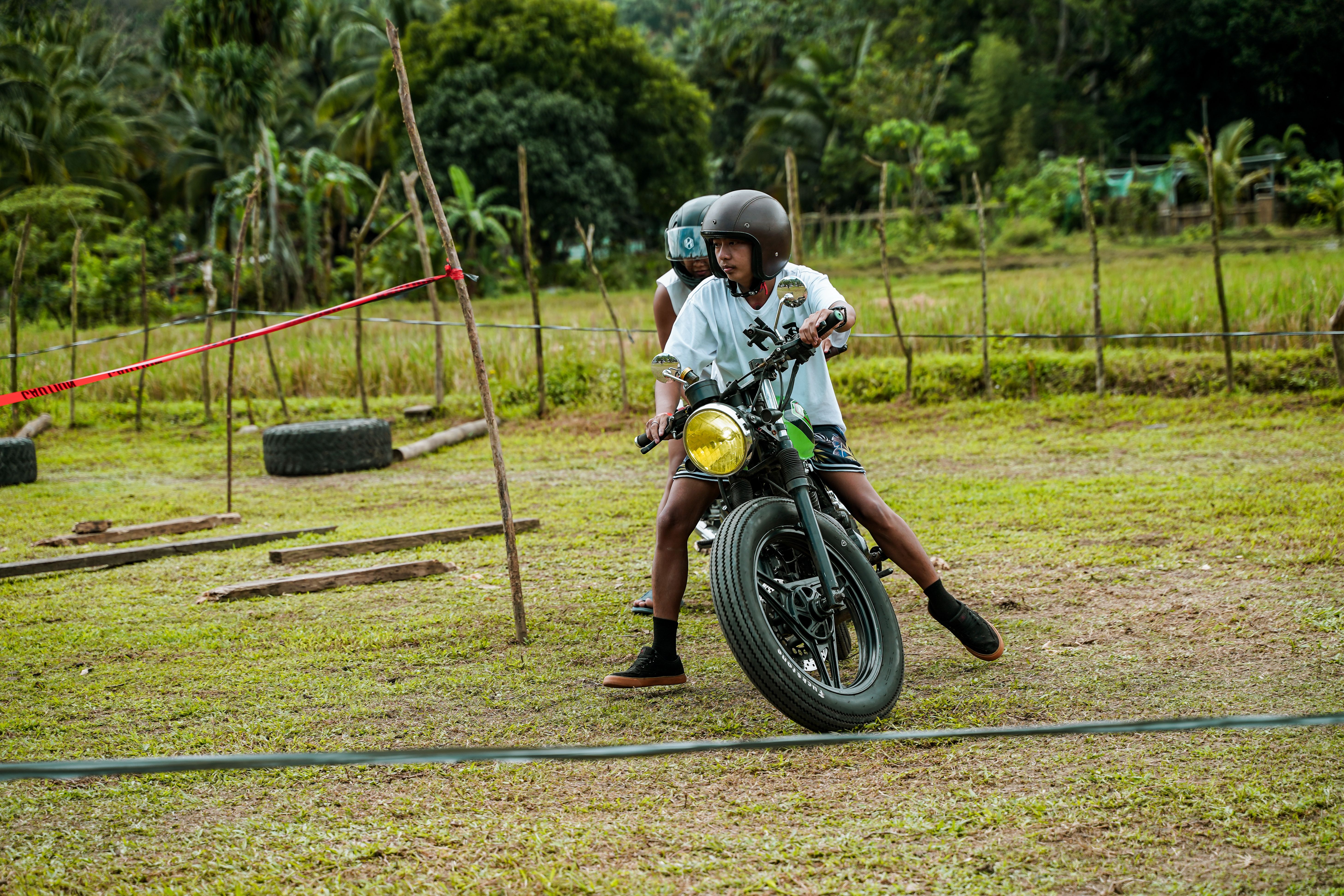 Motorbike Training in Rural Philippines Field · Free Stock Photo