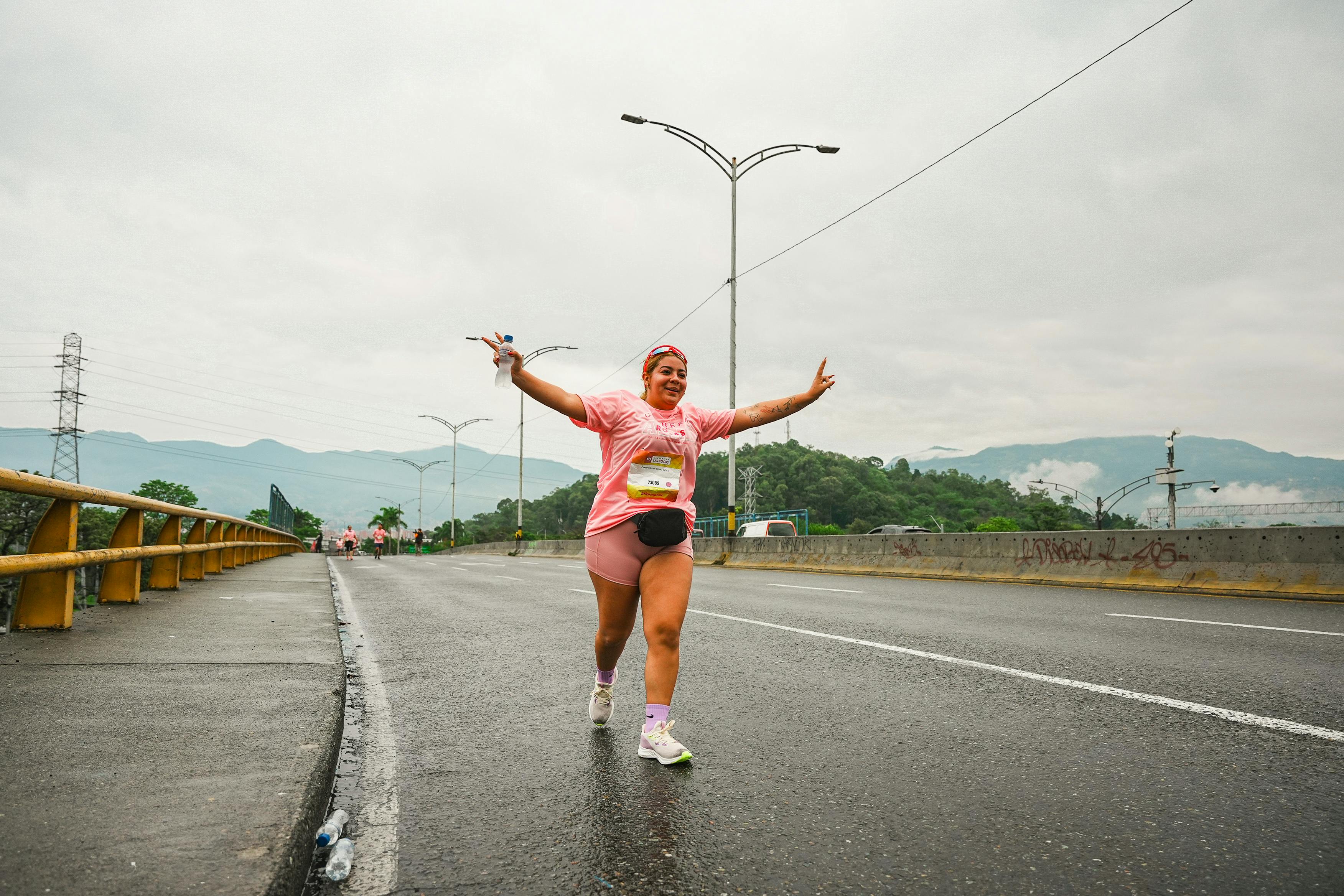 Joyful Runner Completing Outdoor Marathon · Free Stock Photo