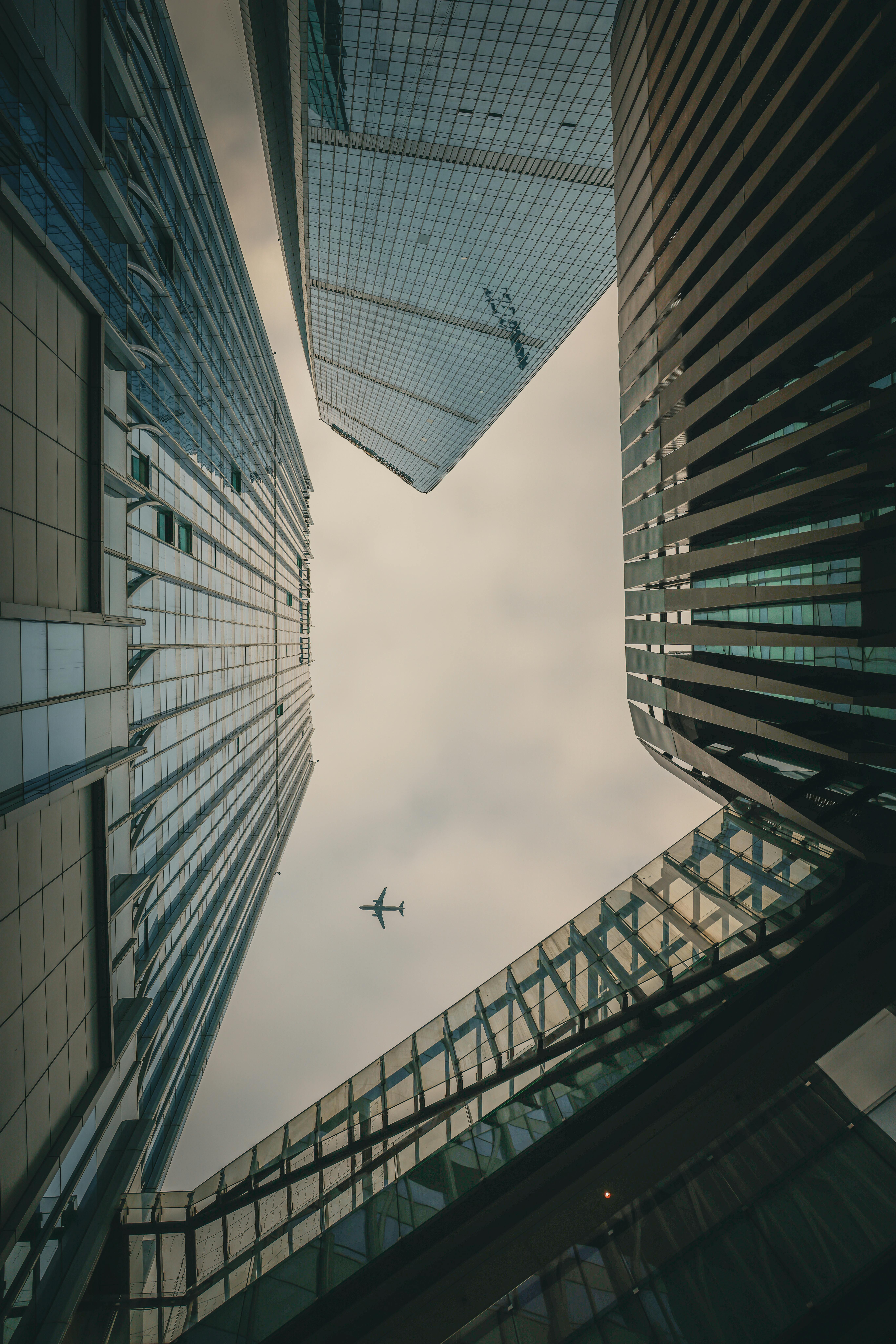Dynamic Skyscraper View with Airplane in Shenzhen · Free Stock Photo