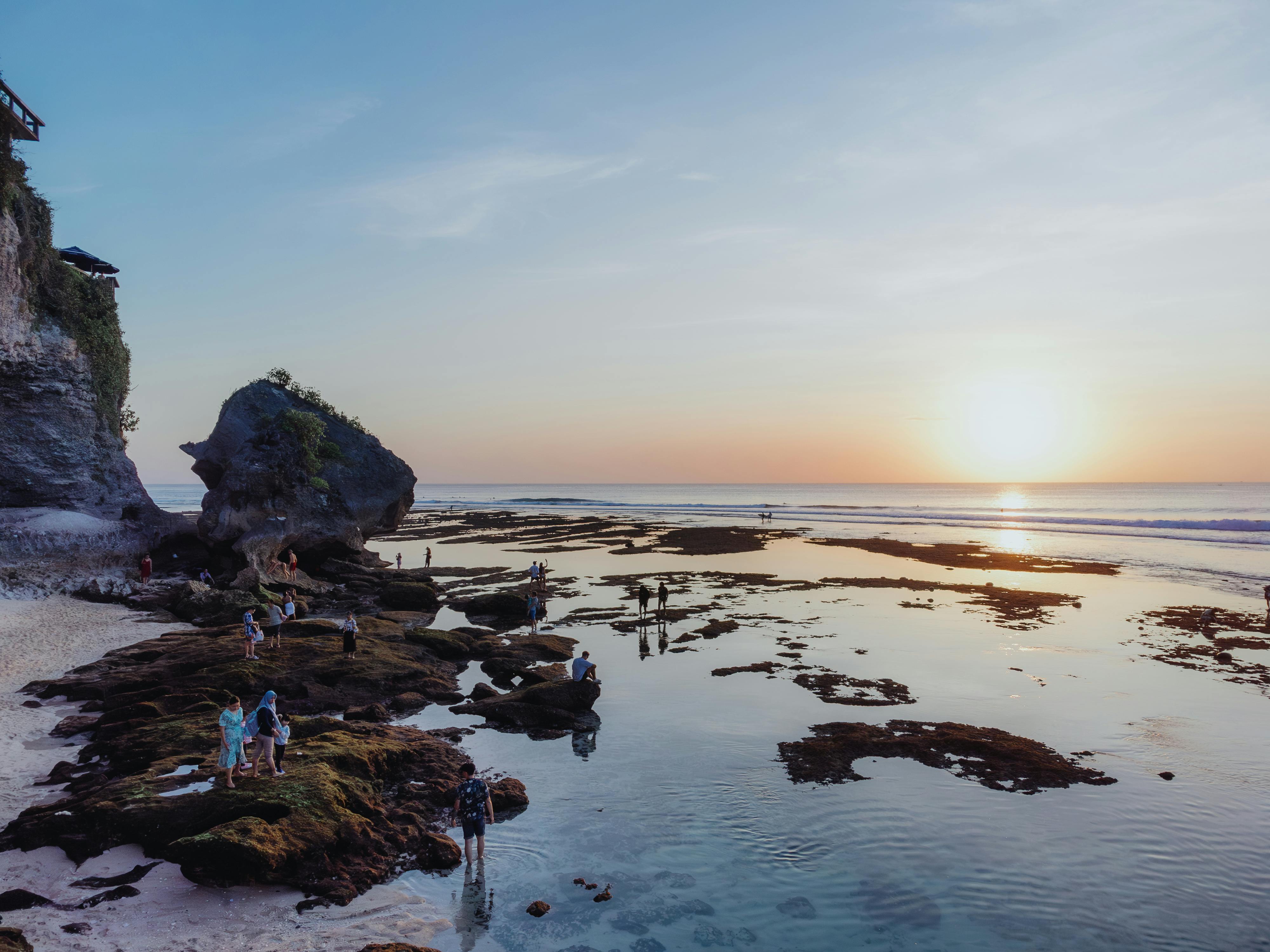 Stunning Bali Beach Sunset with Coastal Landscape · Free Stock Photo