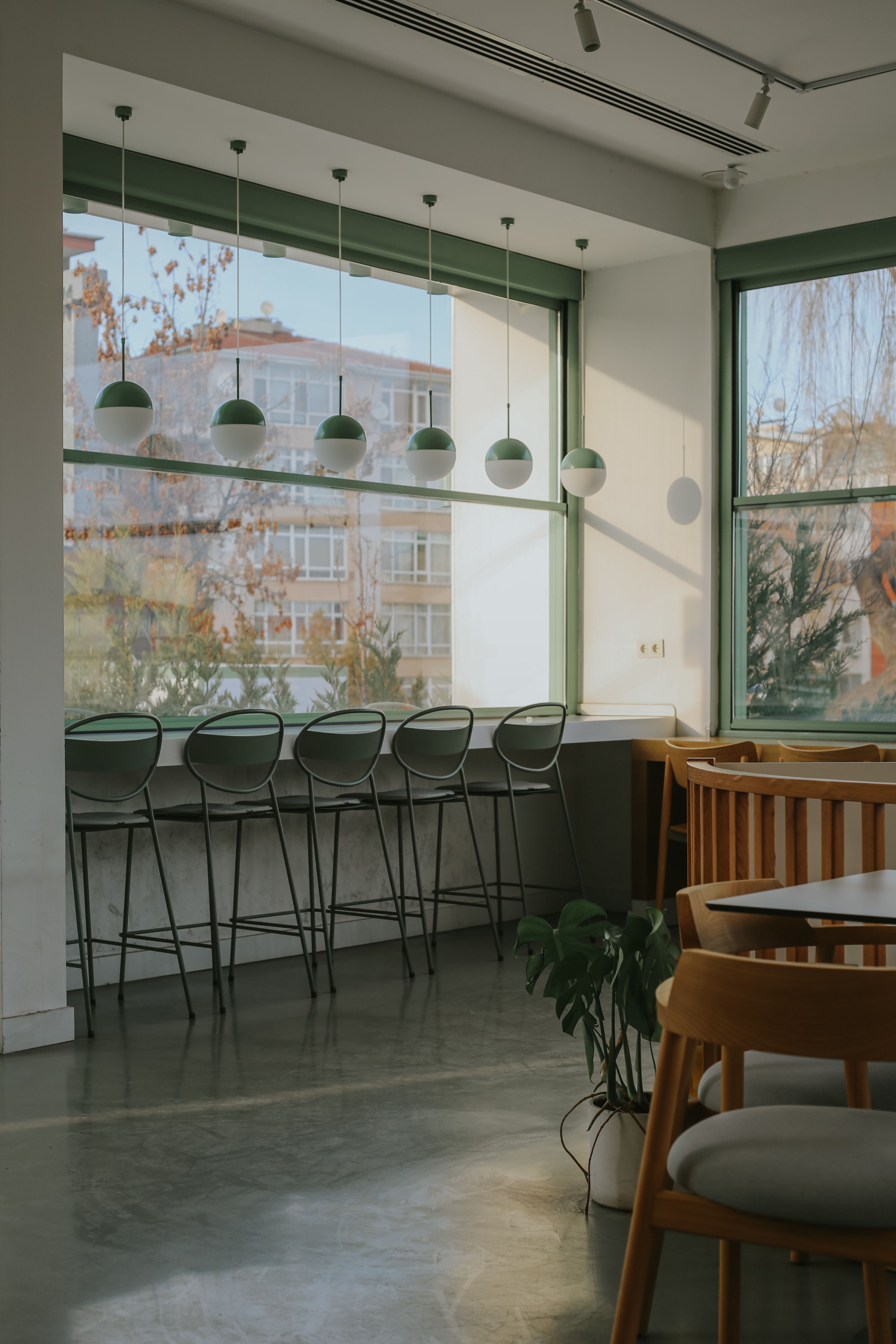 Modern Cozy Cafe Interior with Natural Light · Free Stock Photo