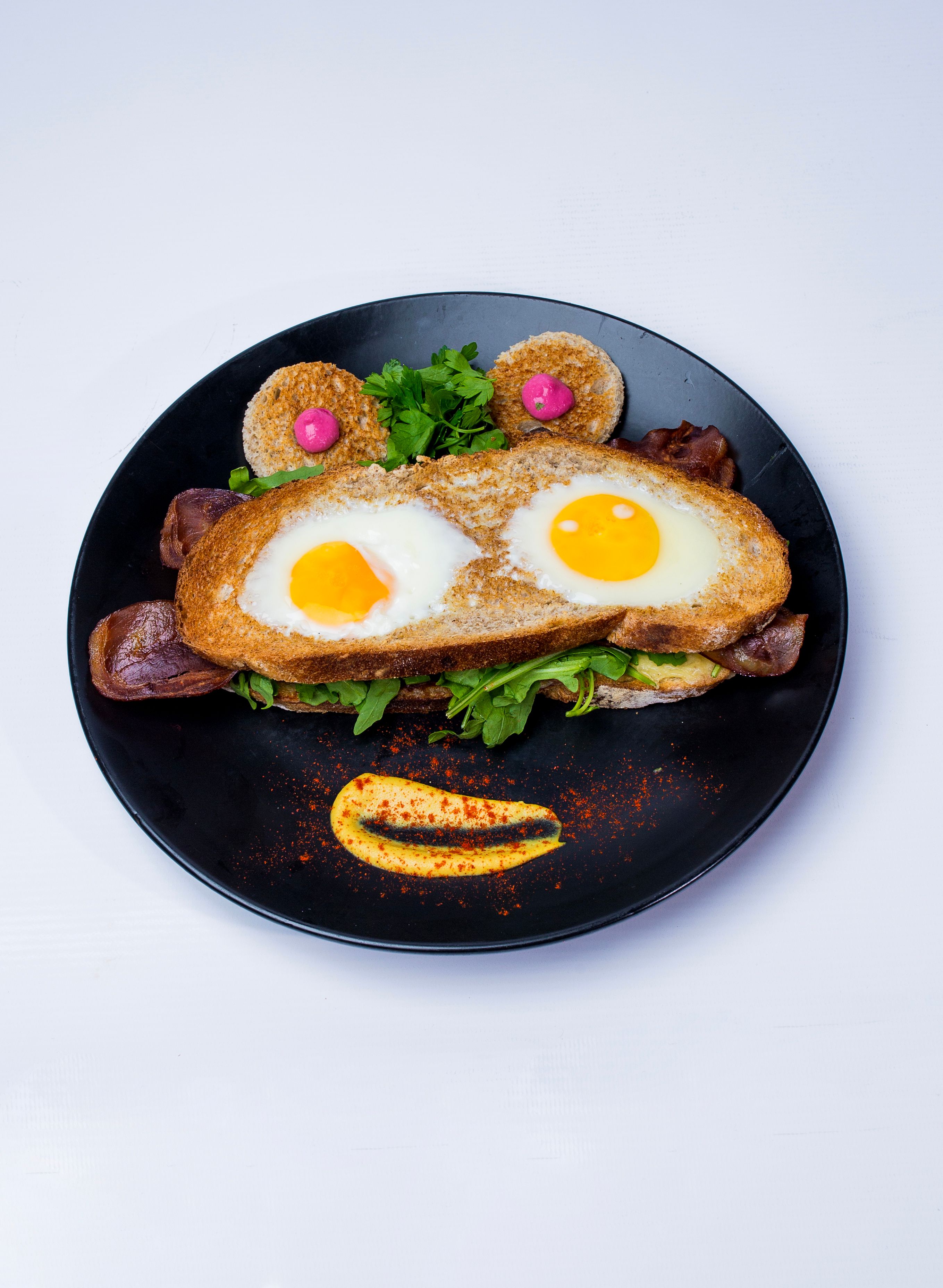 Creative Breakfast with Eggs and Toast Art · Free Stock Photo