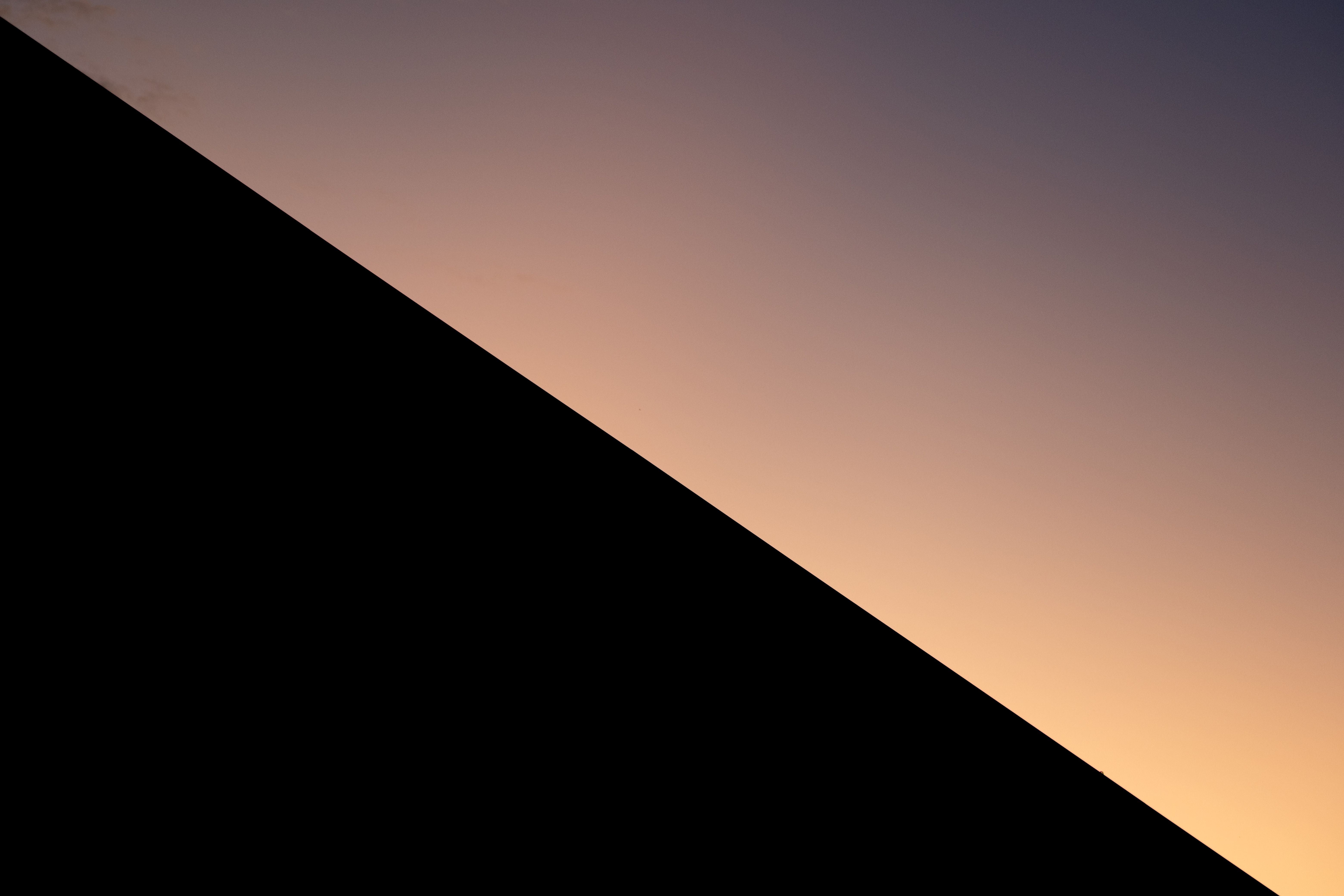 Dramatic Sunset Sky with Diagonal Silhouette · Free Stock Photo