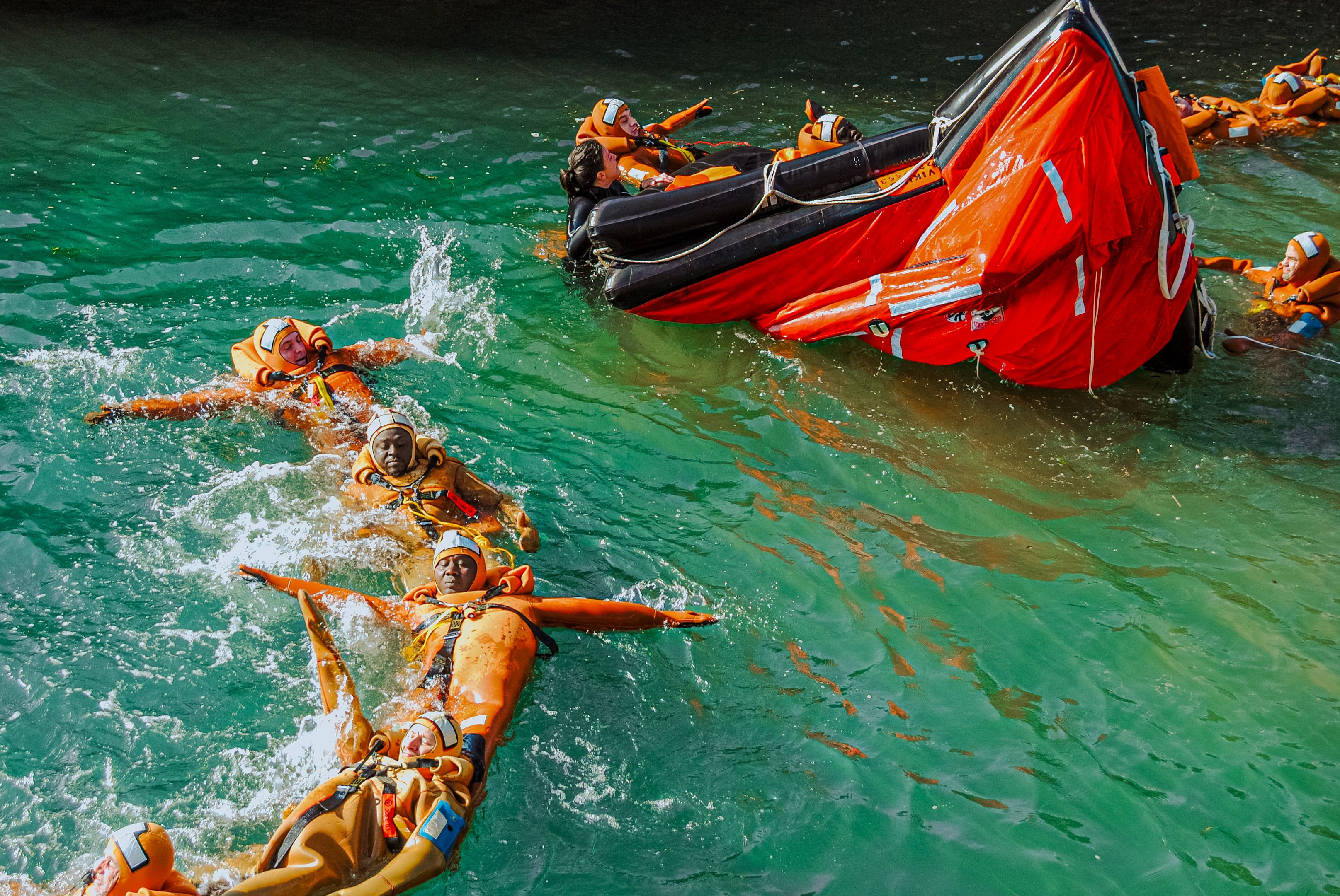 Lifeboat Safety Drill with People in Water · Free Stock Photo