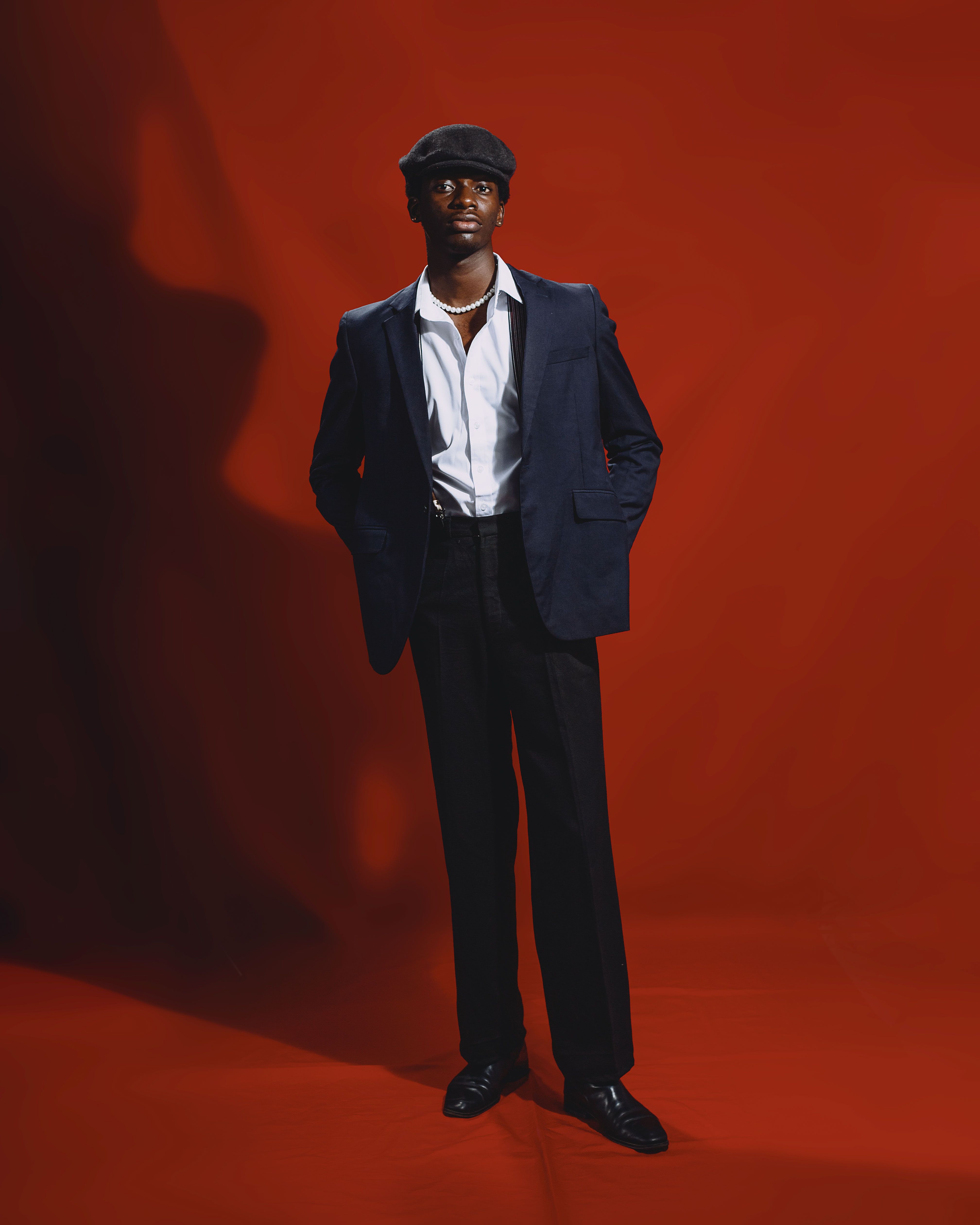 Stylish Portrait of Man in Ghana with Bold Background · Free Stock Photo