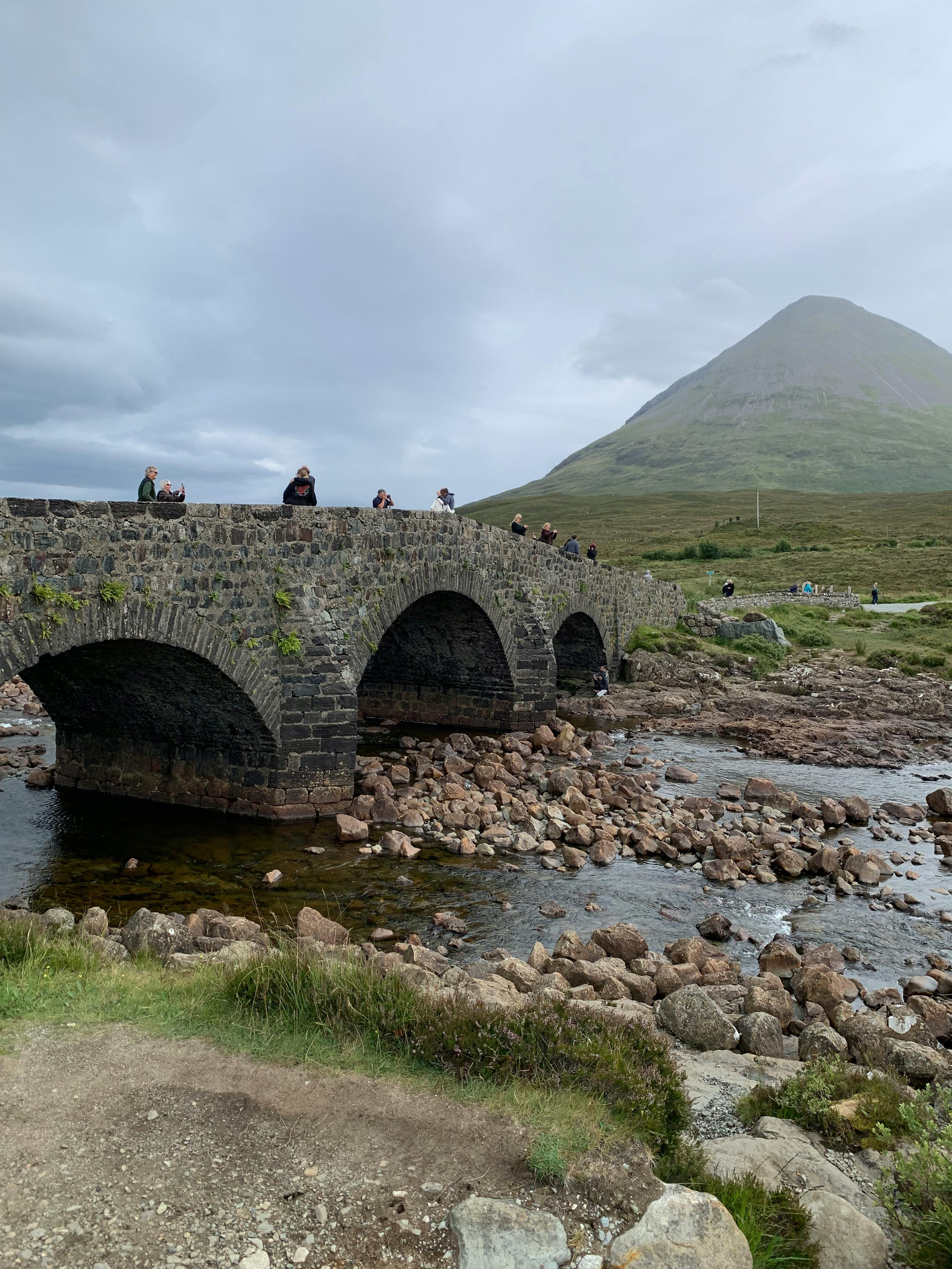Green Grass Covered Mountain Range With Road · Free Stock Photo