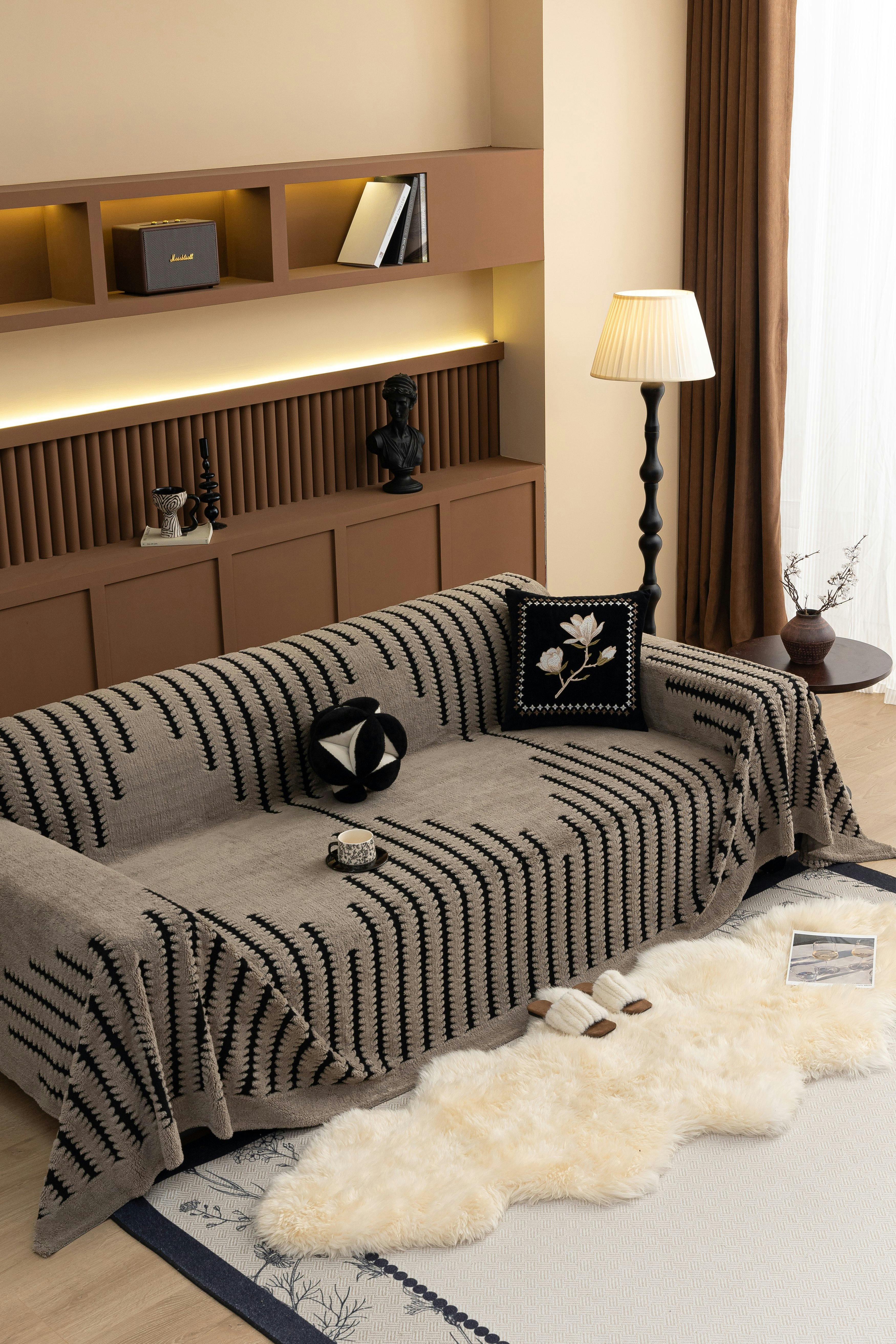 Elegant Living Room with Patterned Sofa Cover · Free Stock Photo