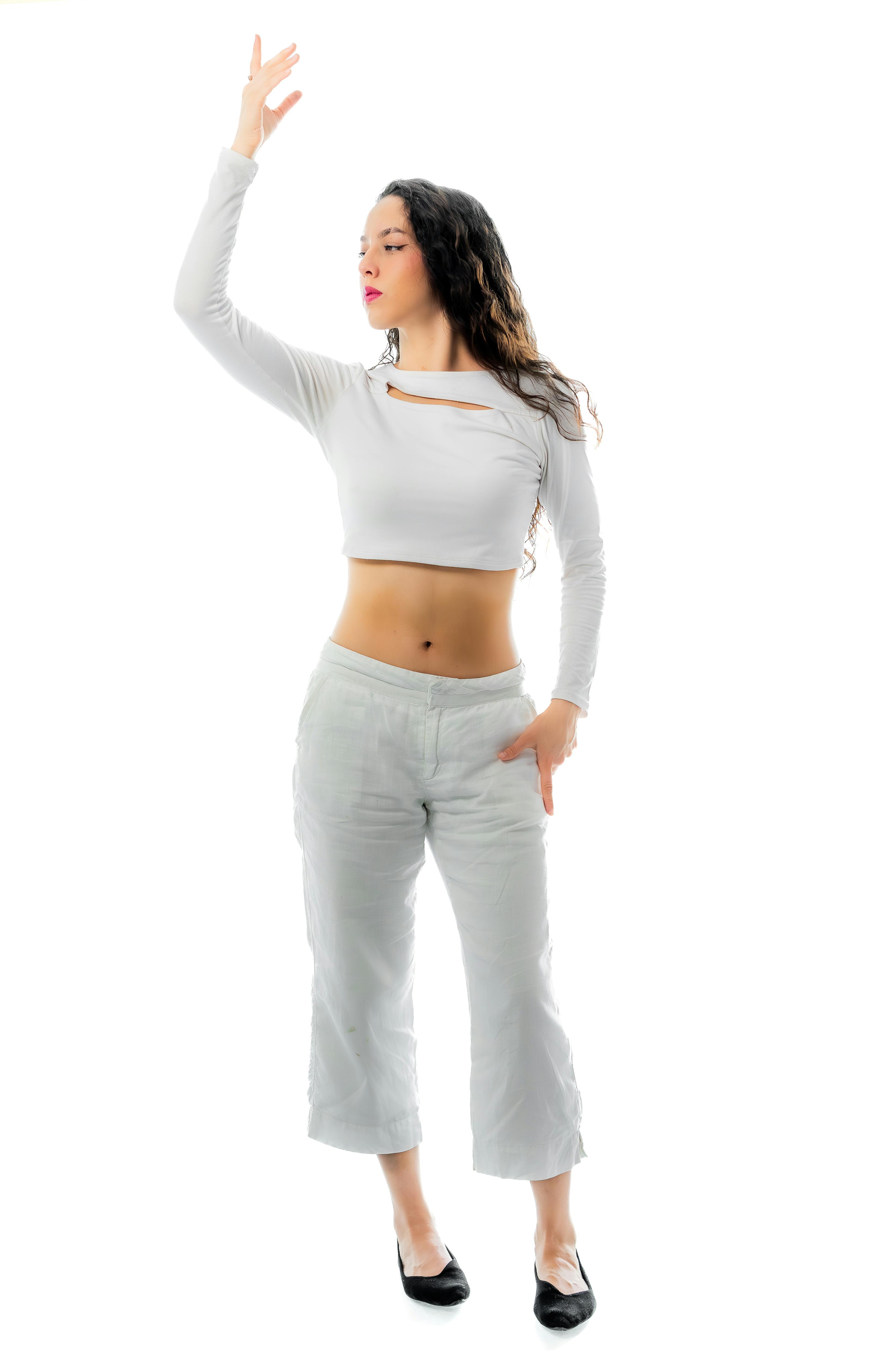 Modern Dancer Striking a Creative Pose in Studio · Free Stock Photo