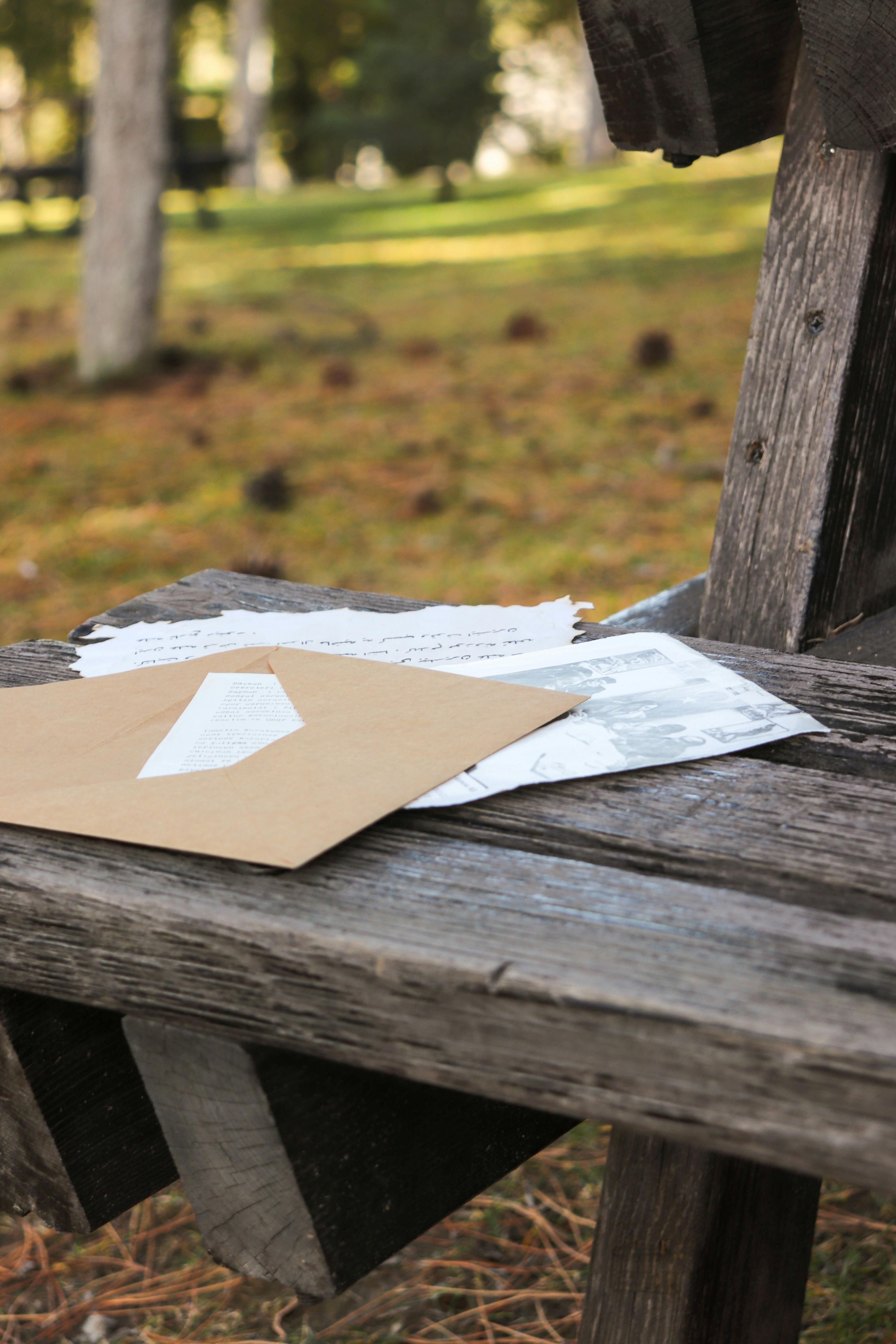 Rustic Wooden Bench with Letters Outdoors · Free Stock Photo