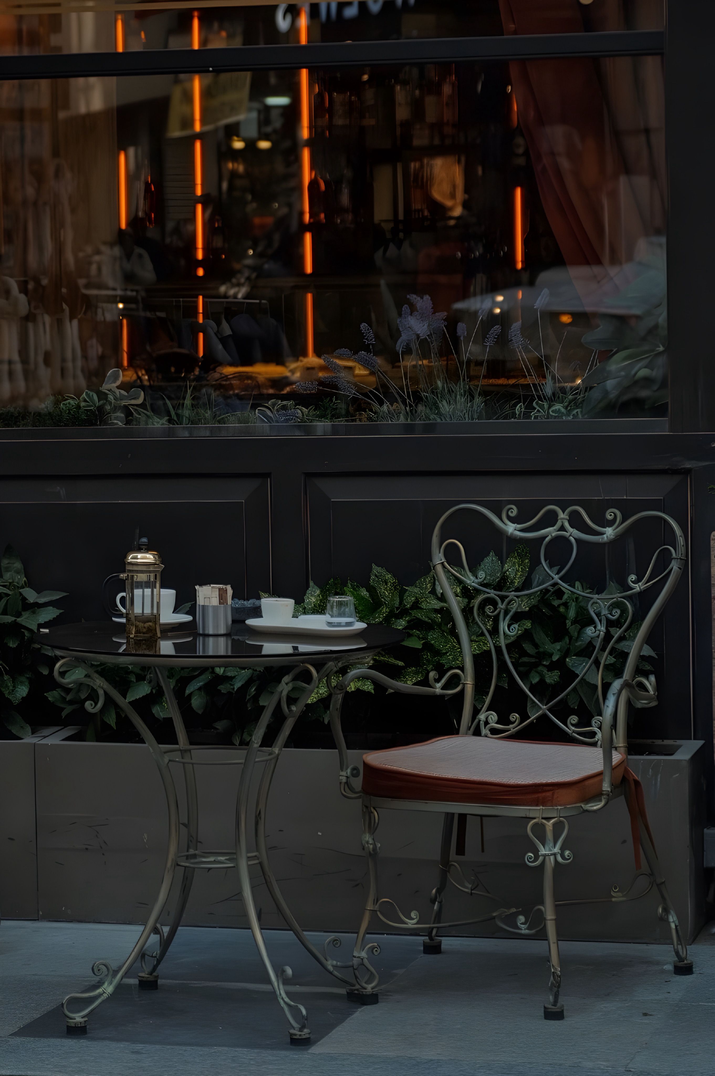 Elegant Outdoor Café Seating with Coffee Setup · Free Stock Photo