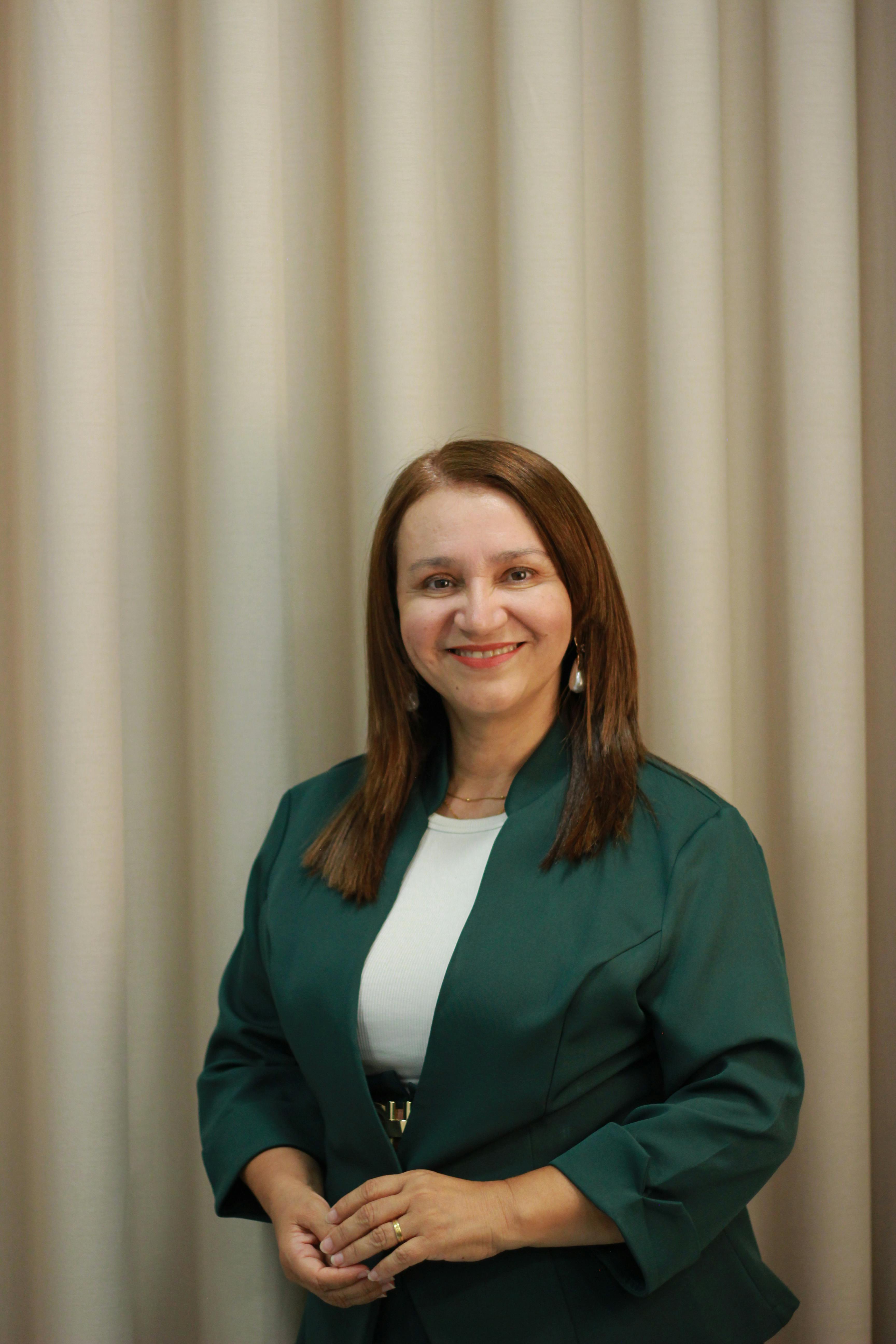 Professional Female Portrait in Business Attire · Free Stock Photo