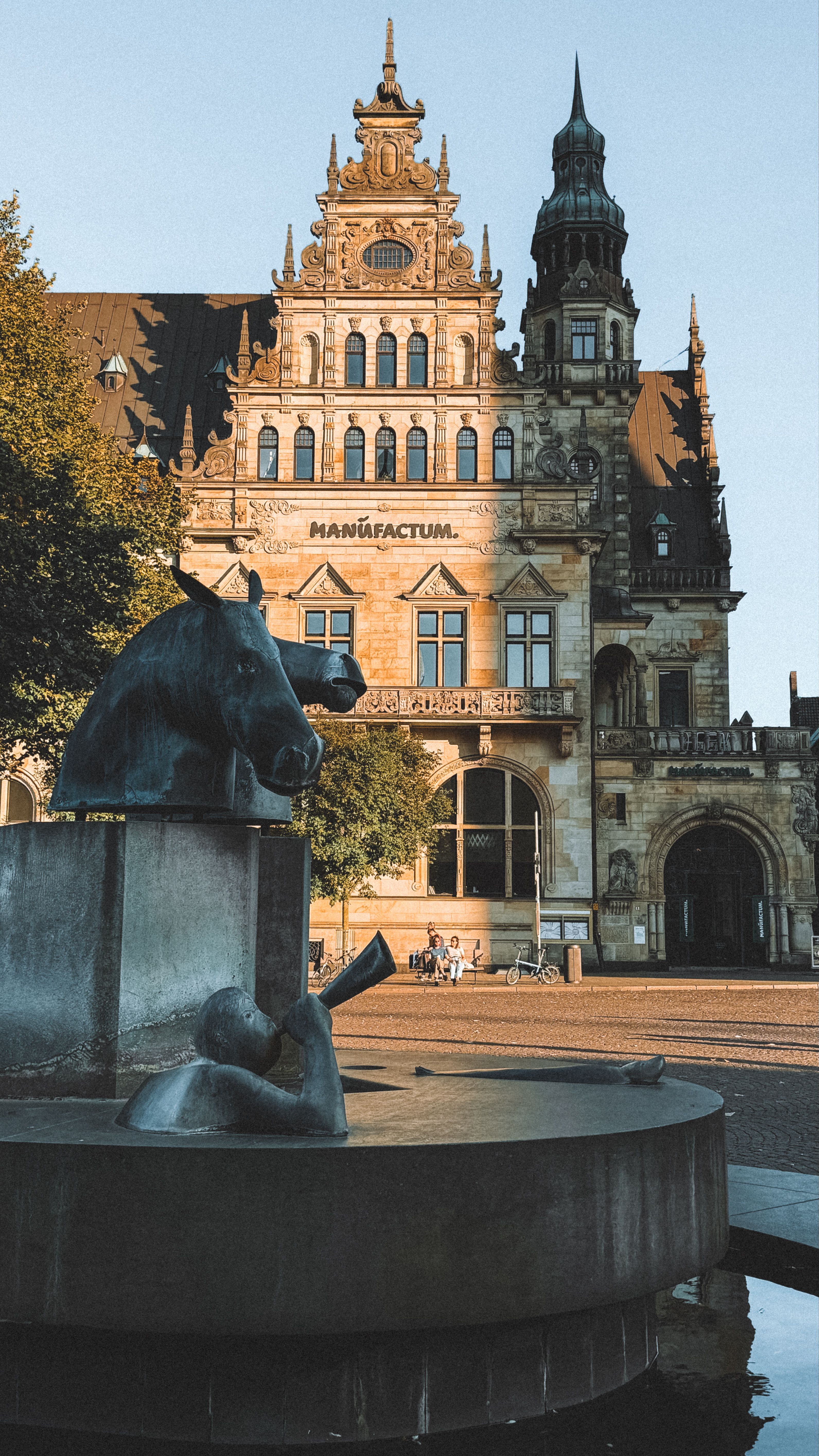 Historic Architectural Building with Fountain · Free Stock Photo