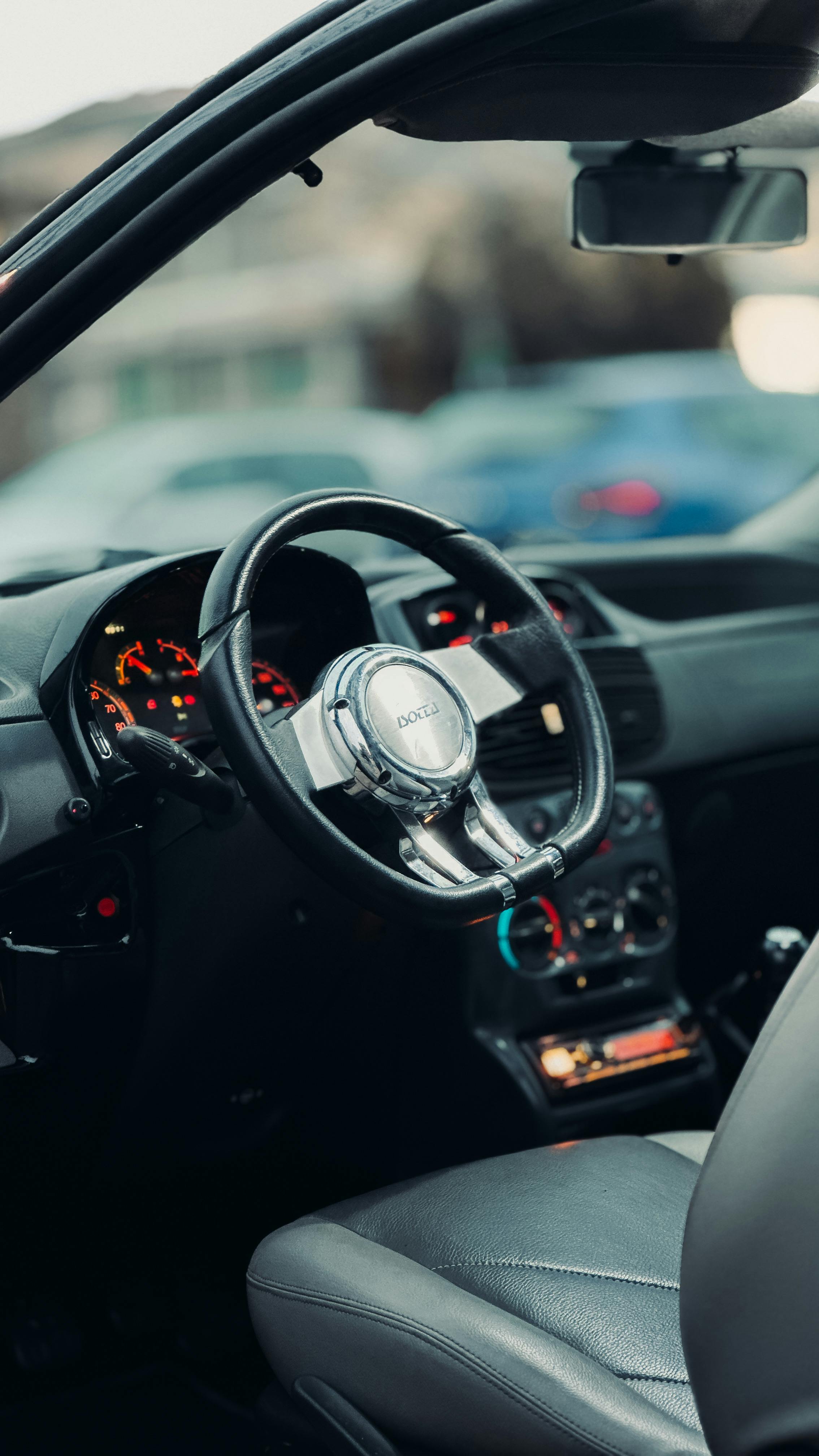 Modern Car Interior with Custom Steering Wheel · Free Stock Photo