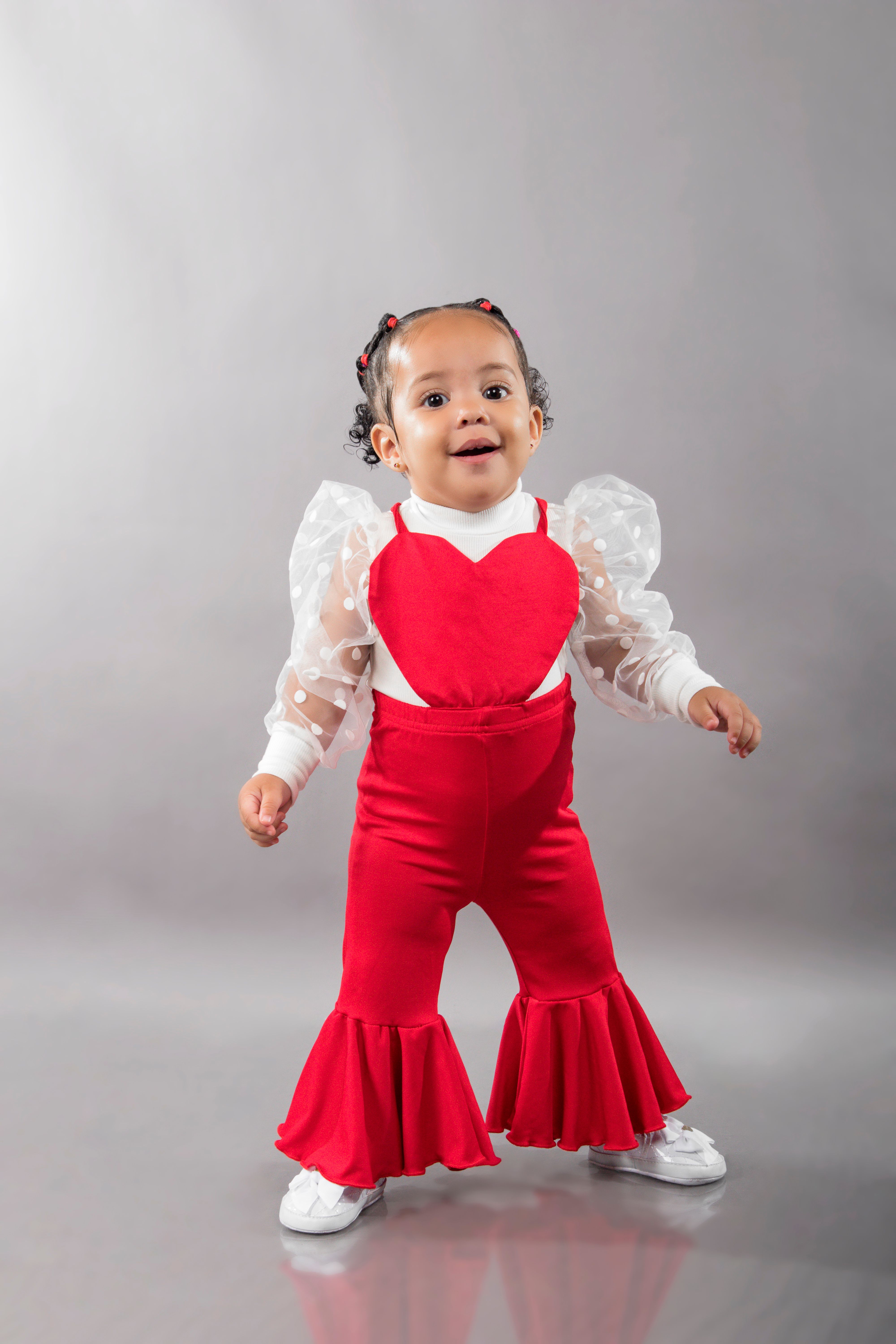 Adorable Child in Red Heart Outfit Studio Portrait · Free Stock Photo
