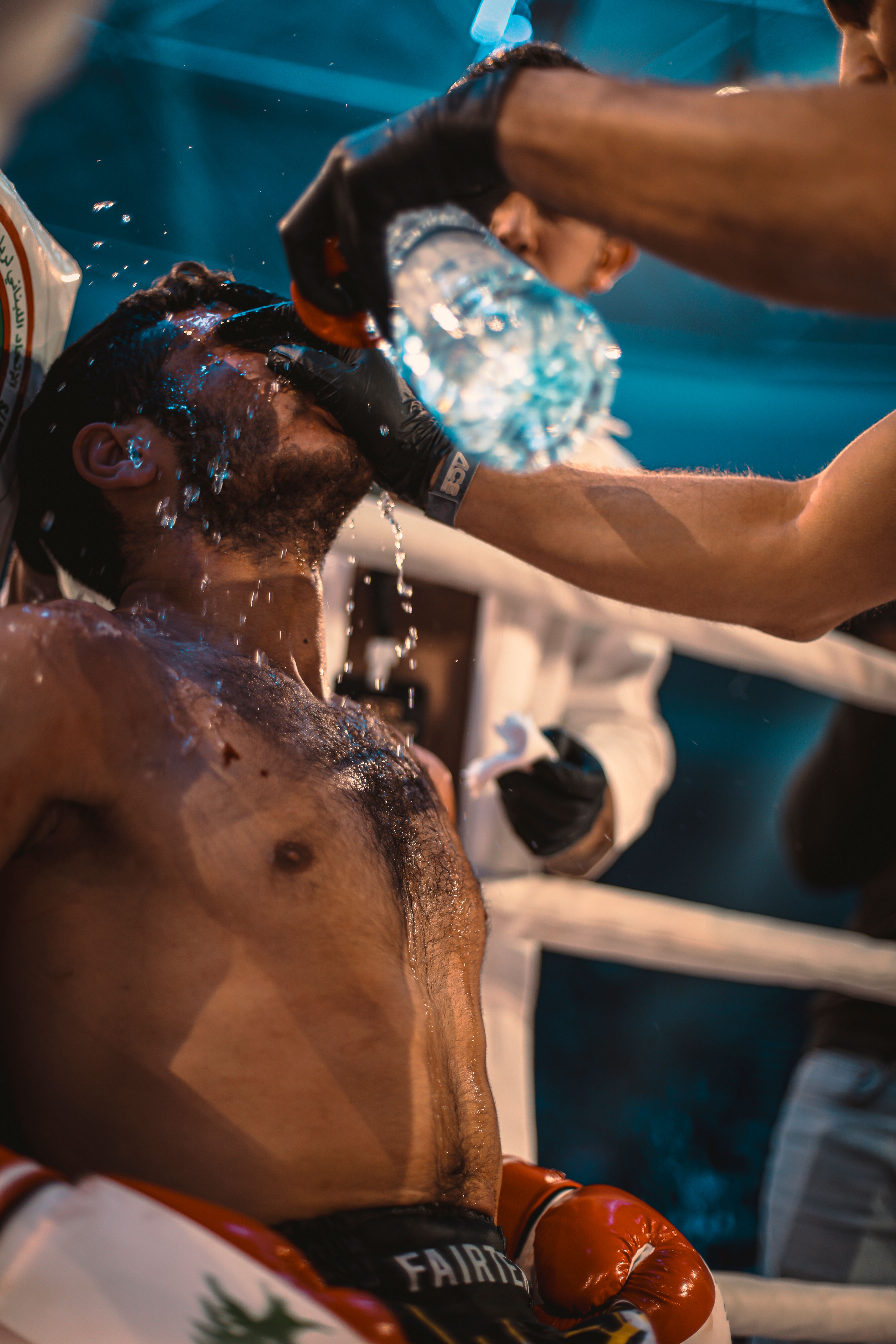 Intense Boxing Match Corner Water Break · Free Stock Photo