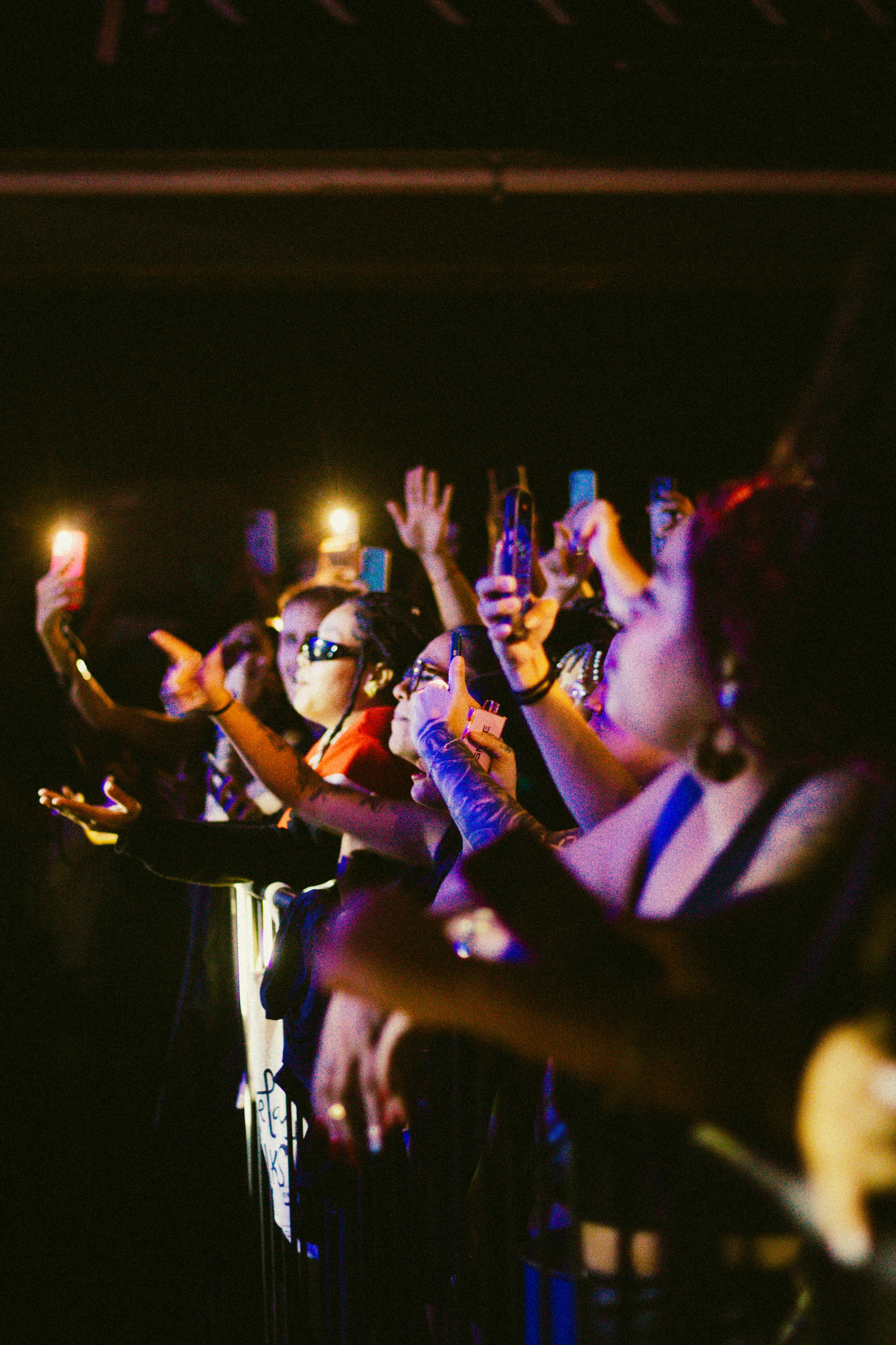 Energetic Concert Crowd with Cell Phone Lights · Free Stock Photo