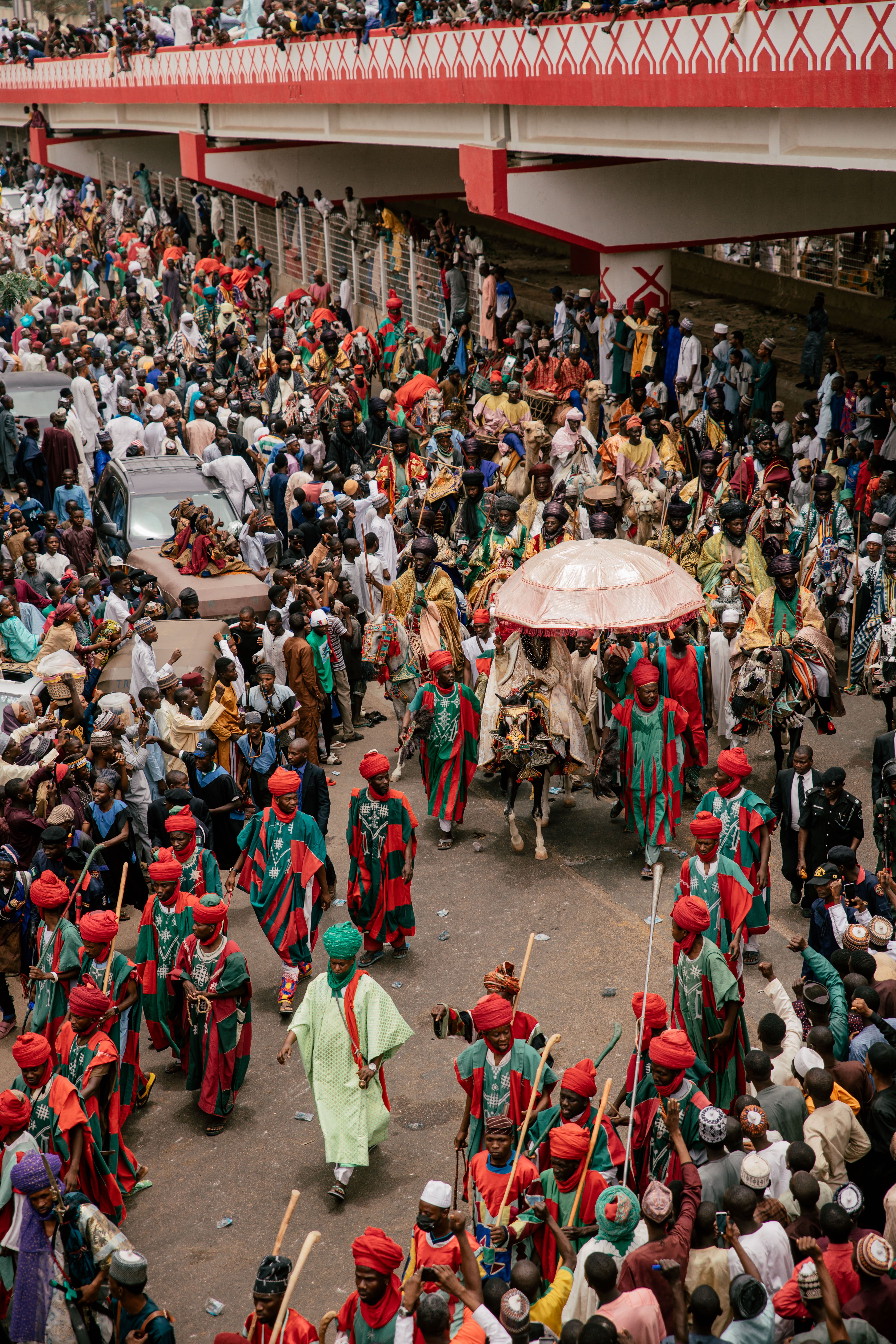 Vibrant Cultural Festival Parade with Traditional Attire · Free Stock Photo