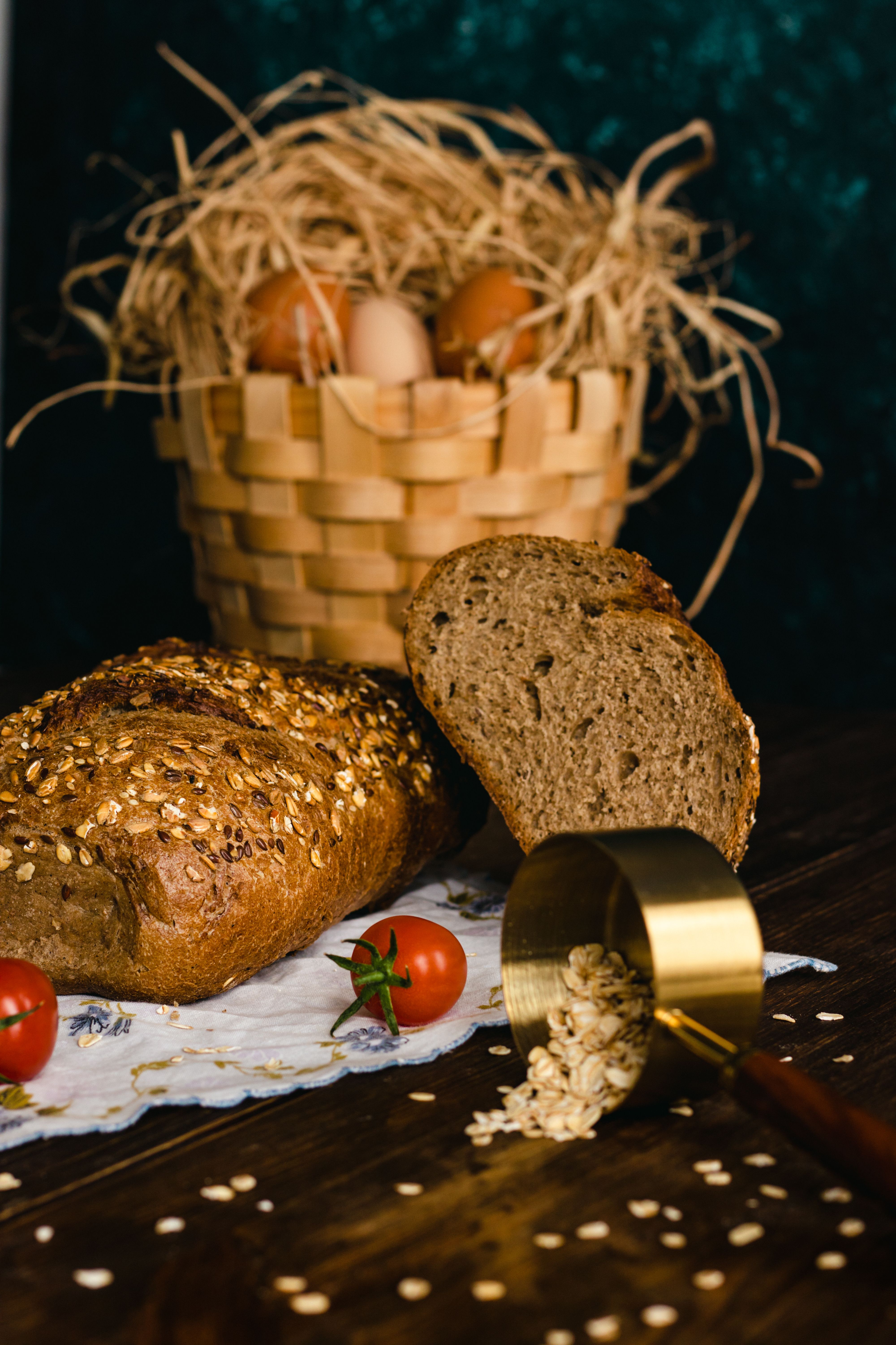 Rustic Bread with Straw Basket and Tomatoes · Free Stock Photo