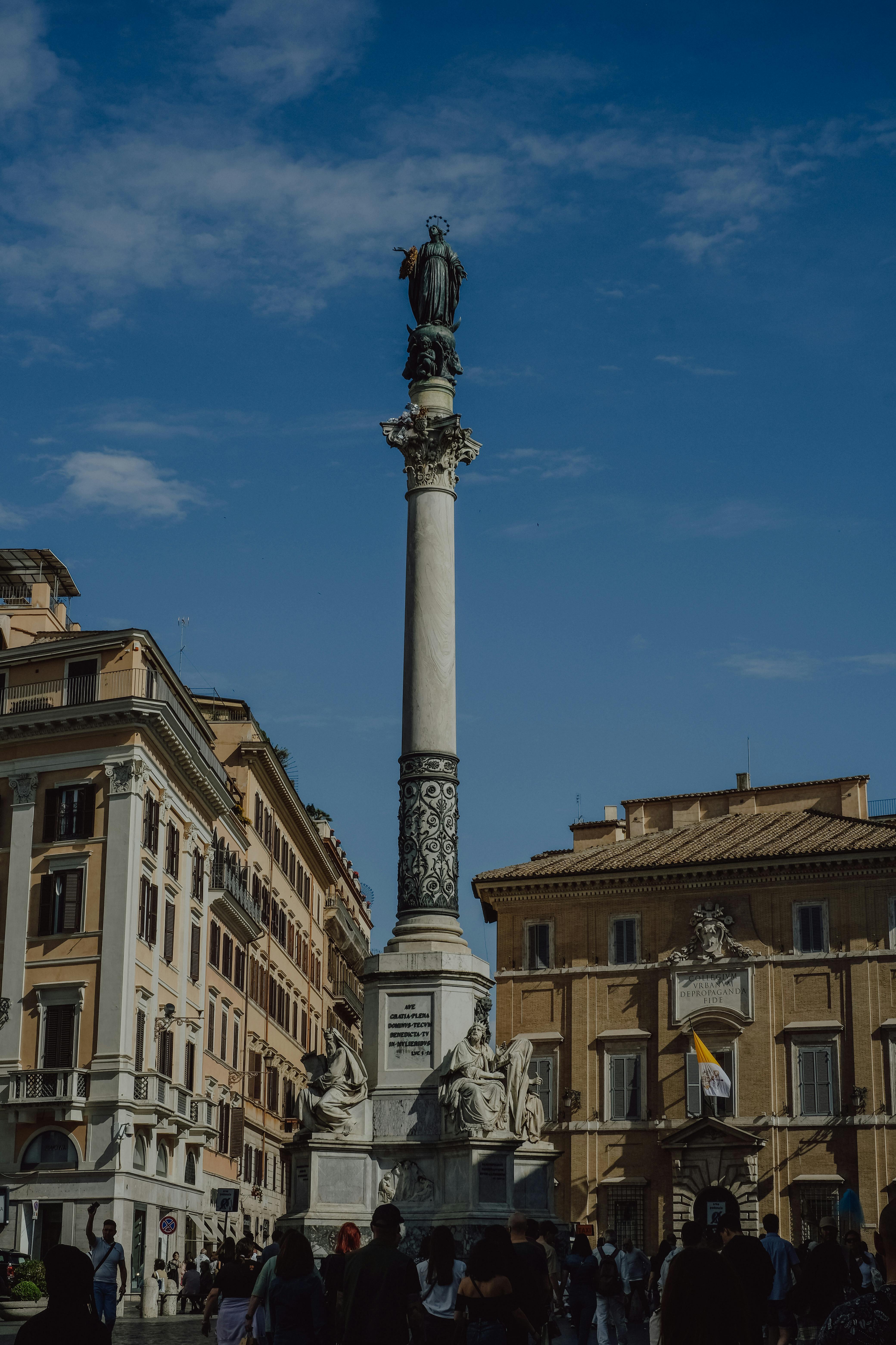 Iconic Column in Rome's Historic Square · Free Stock Photo