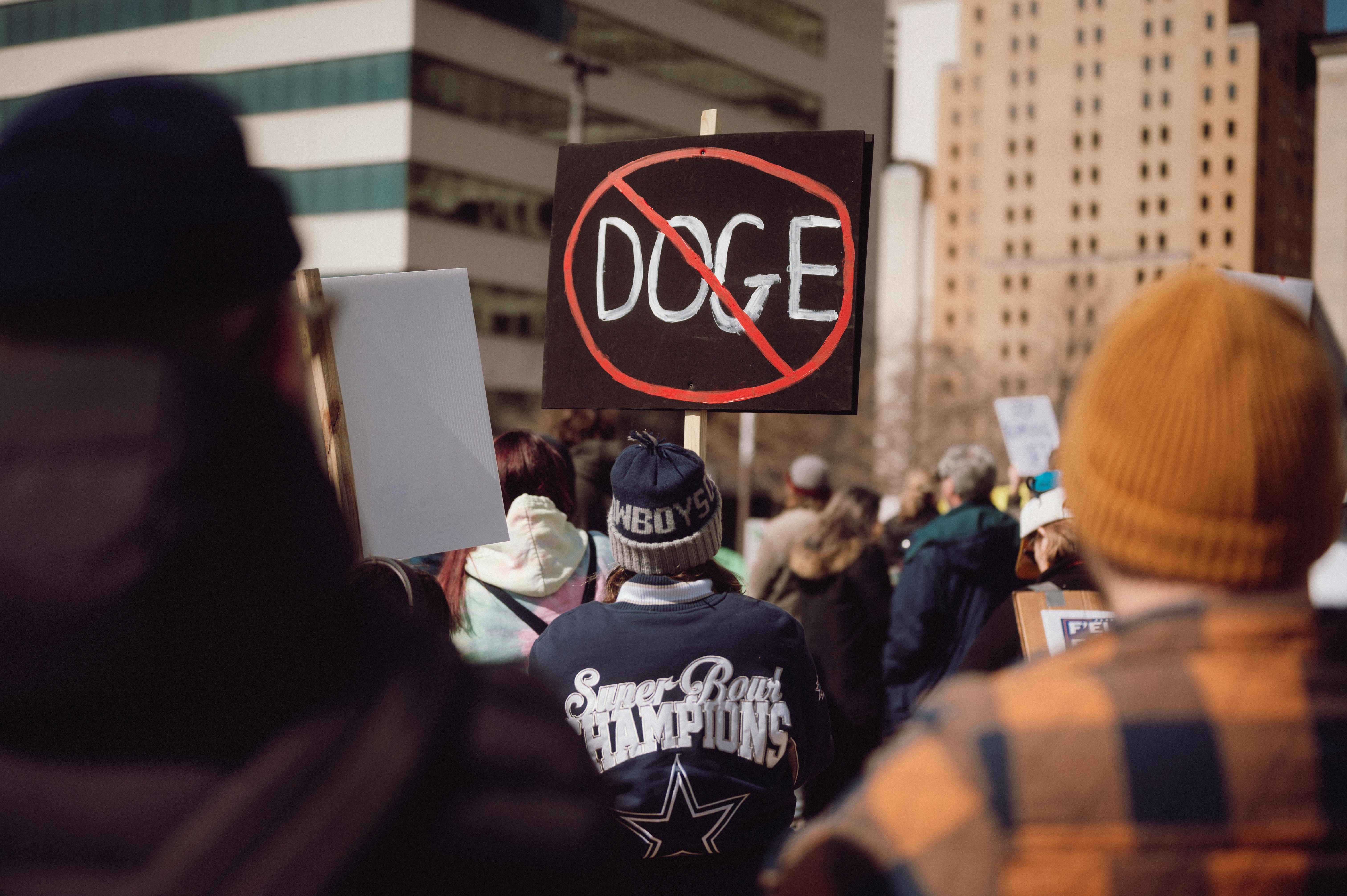 Crowd at Protest with Doge Meme Sign · Free Stock Photo