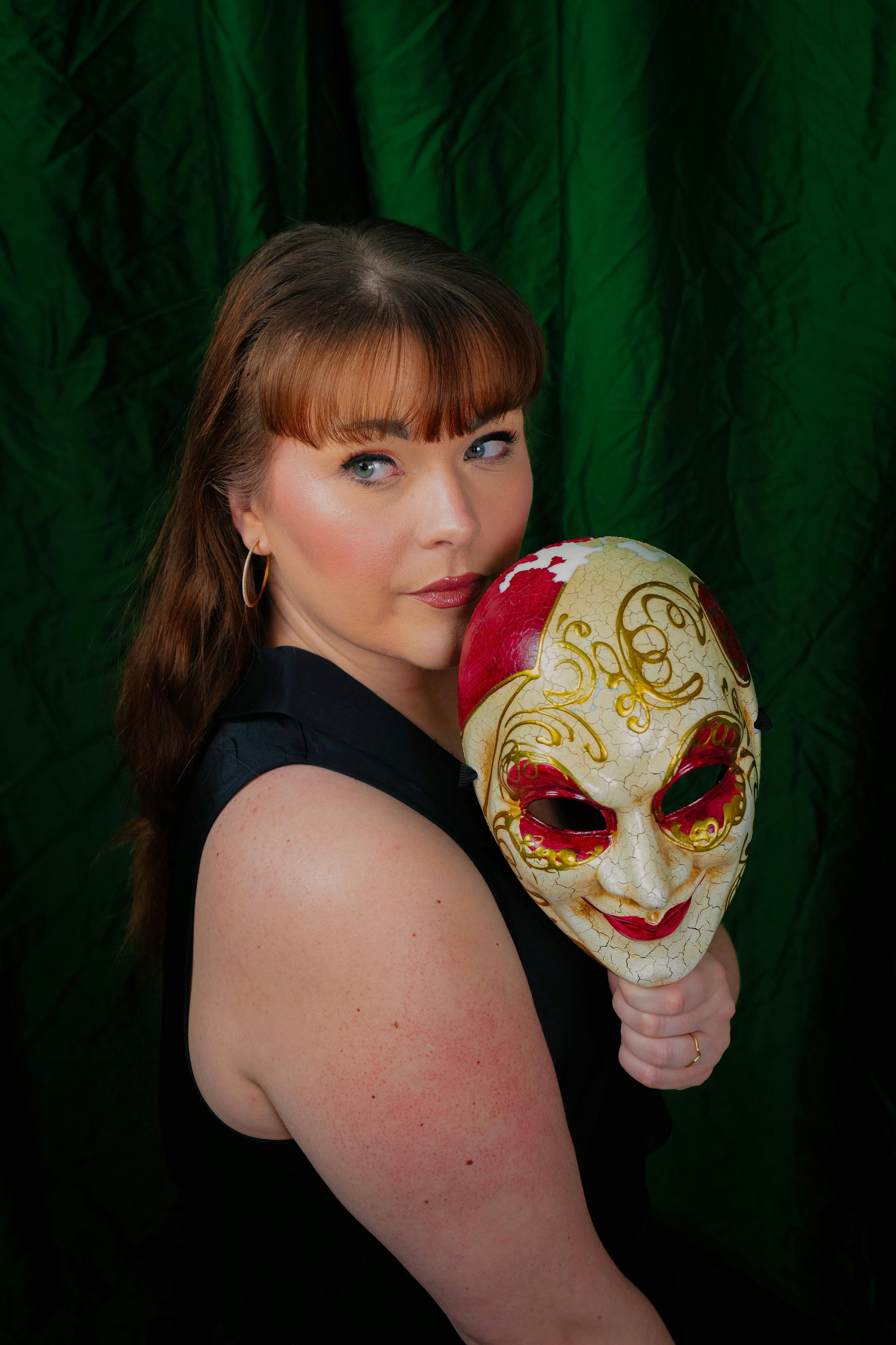 Elegant Portrait with Artistic Mask · Free Stock Photo