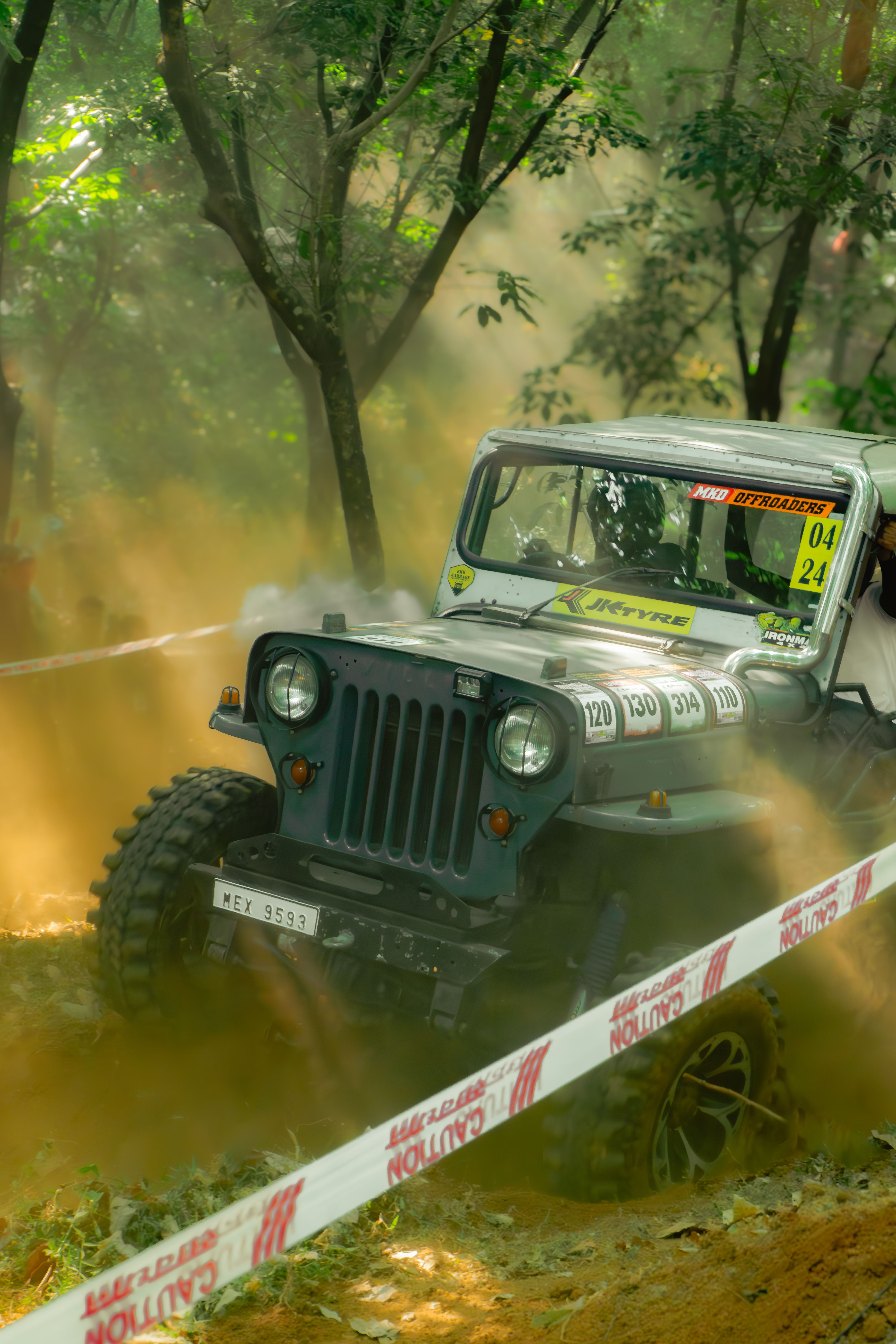 Off-road Vehicle Racing through Forest Terrain · Free Stock Photo