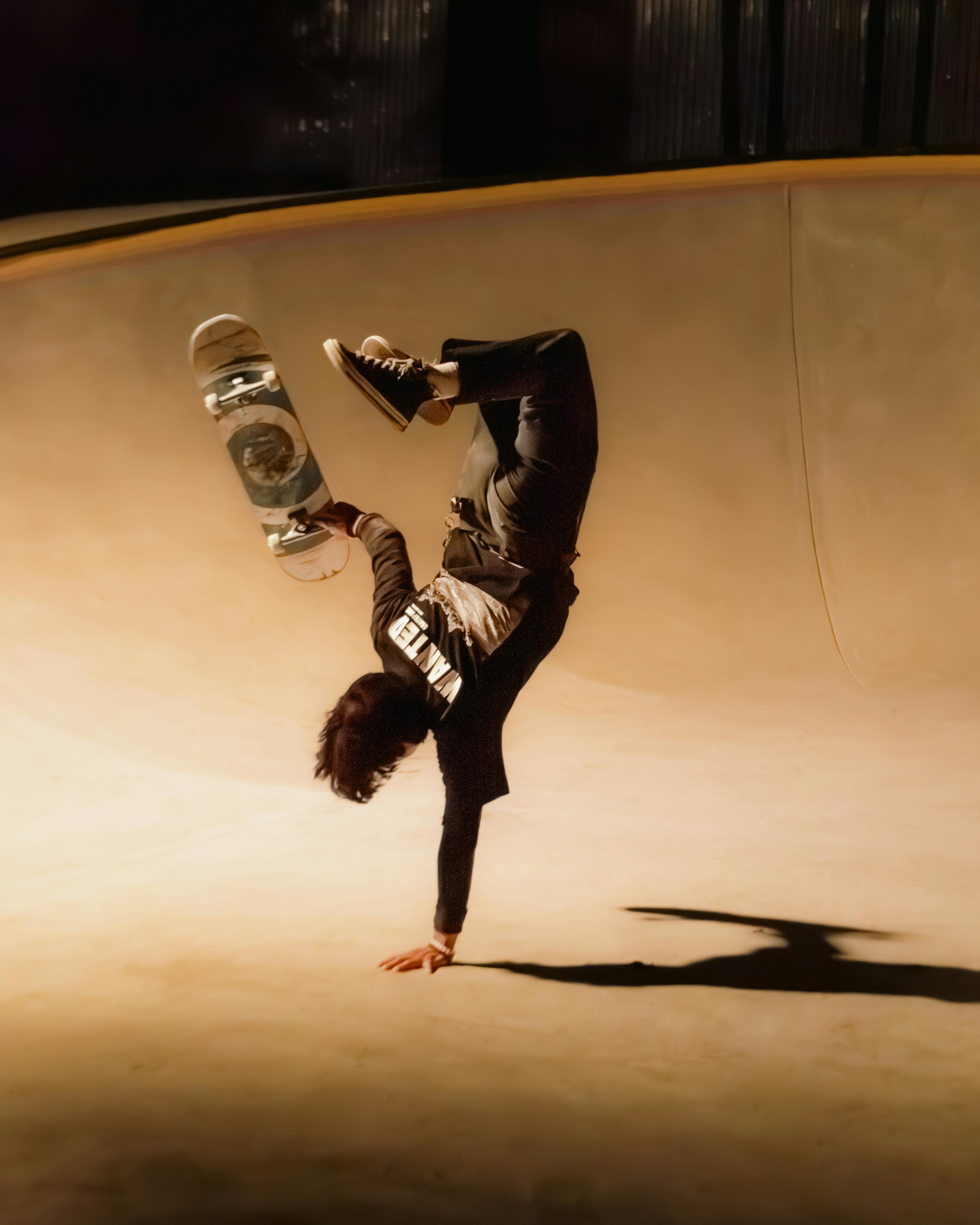 Daring Skateboard Handstand in Skatepark Bowl · Free Stock Photo
