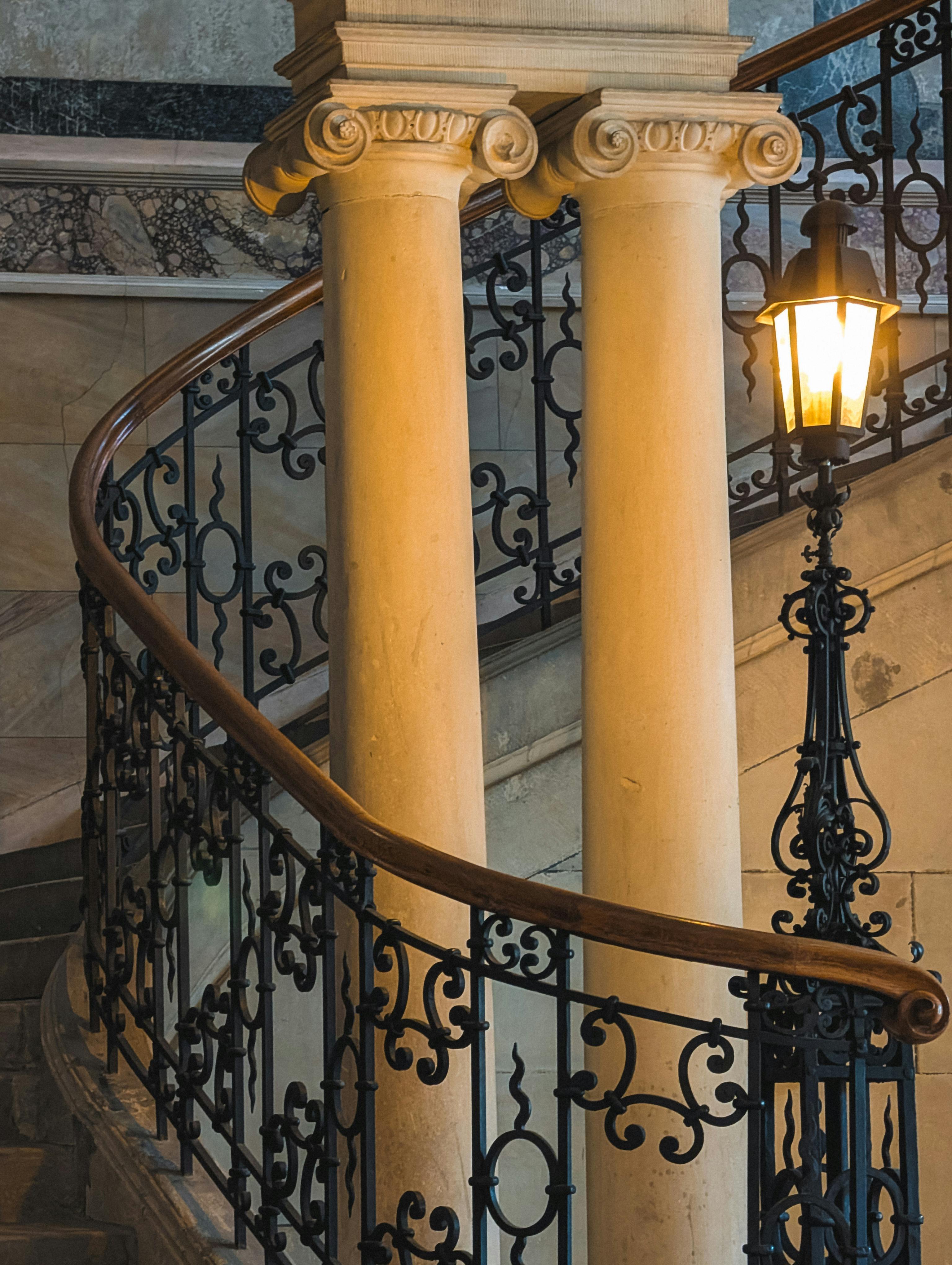 Bend of Decorated Staircase Railing · Free Stock Photo