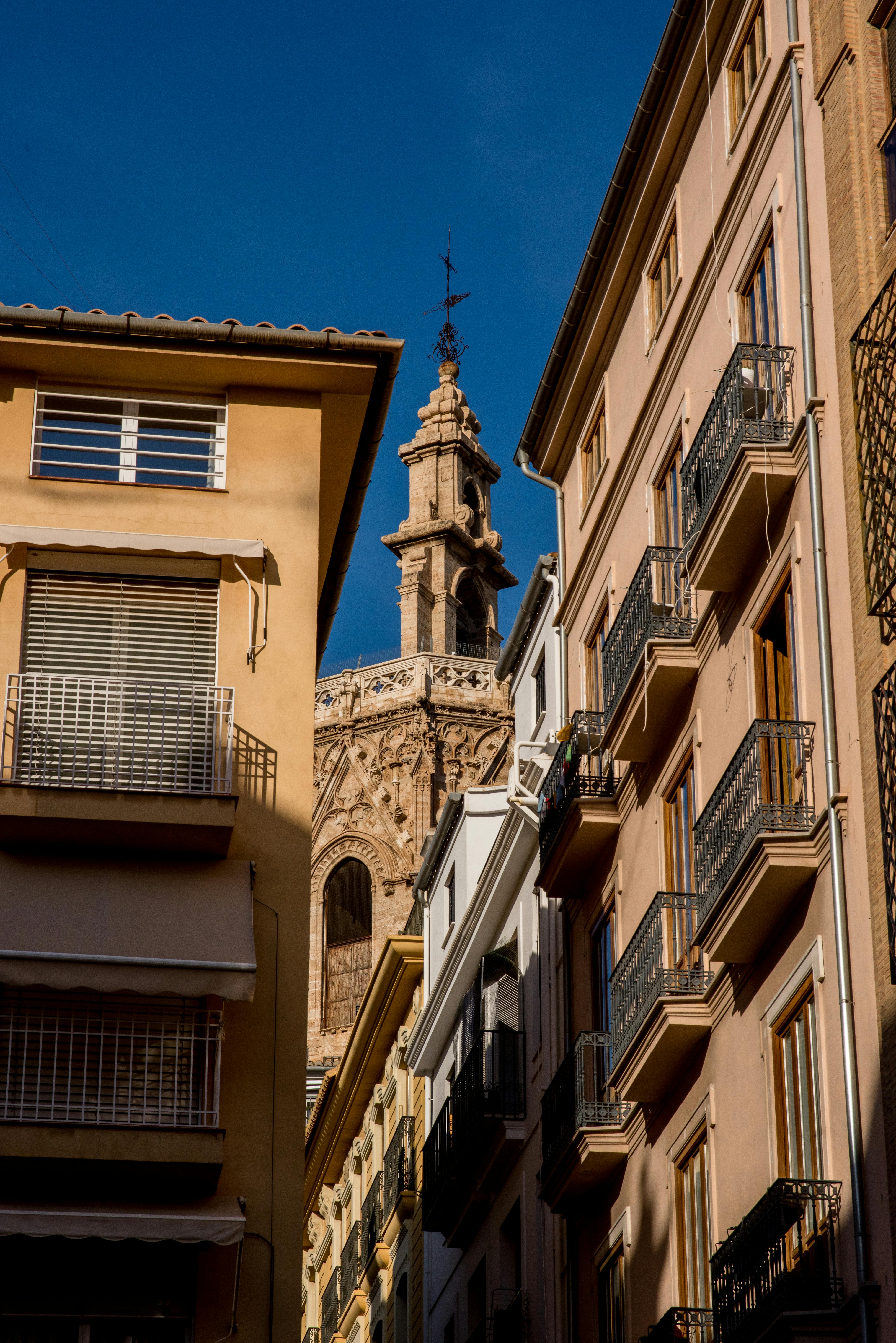 Gothic architecture amidst Valencia street · Free Stock Photo