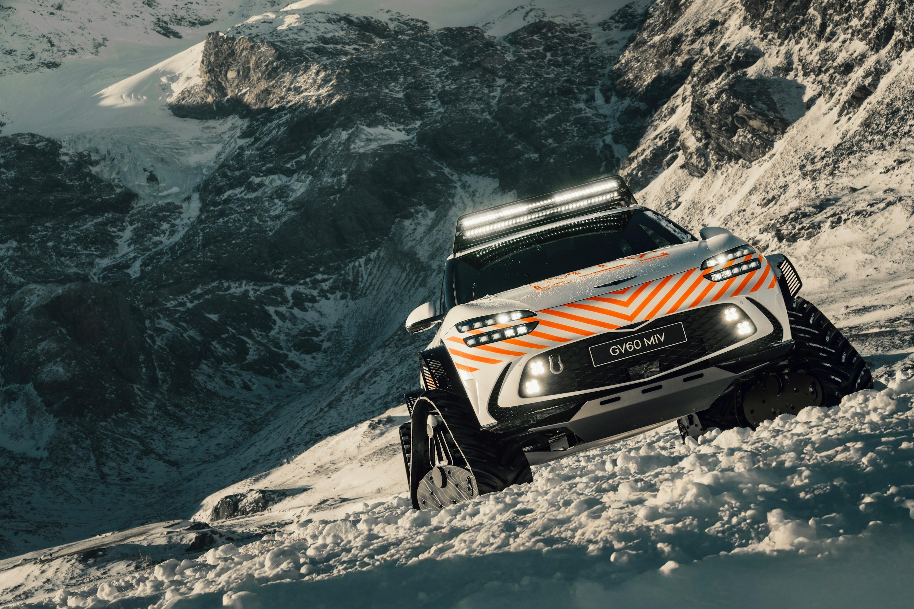Genesis GV60 MIV Concept on Snowy Mountain · Free Stock Photo