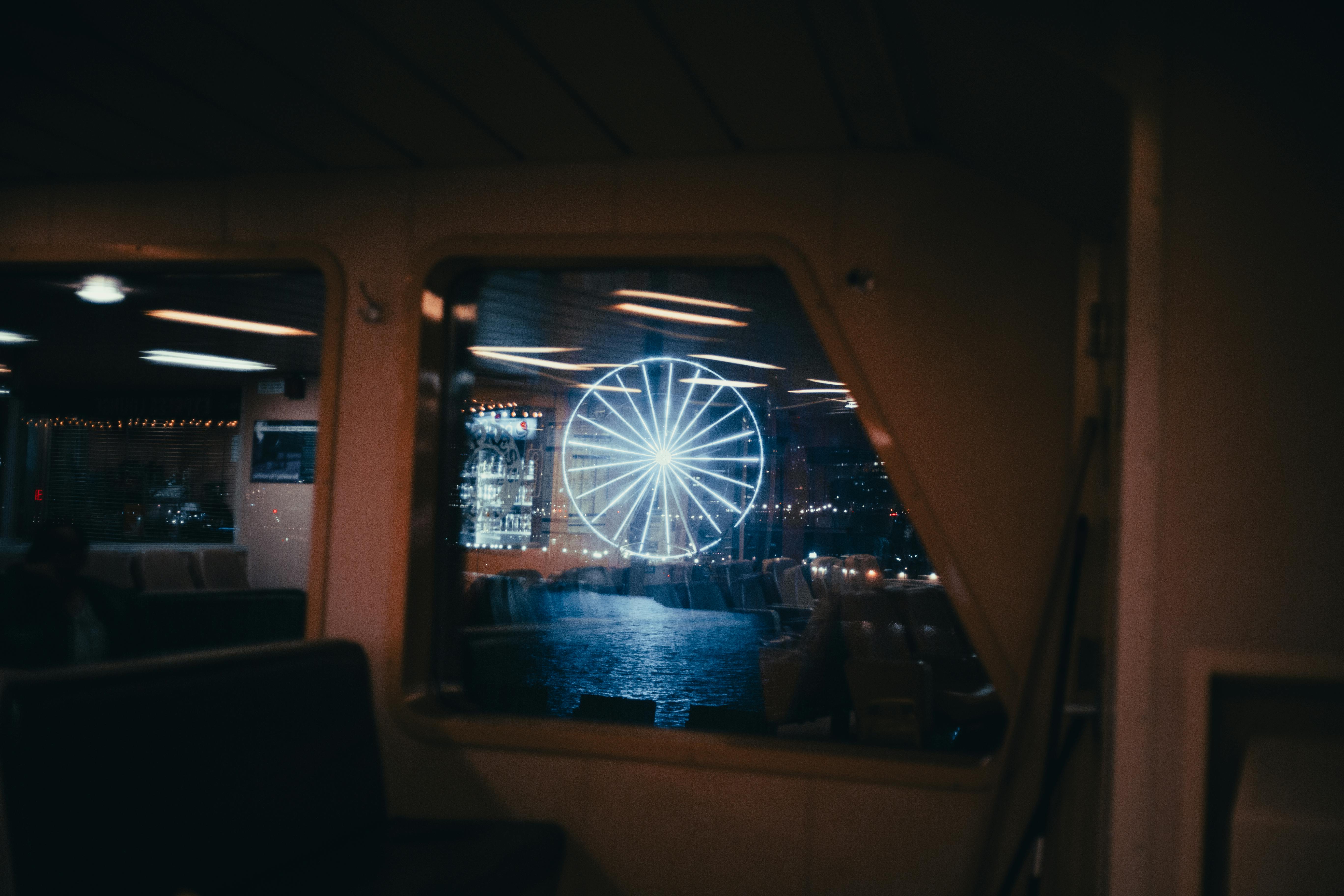Seattle Ferris Wheel Reflection from Ferry · Free Stock Photo