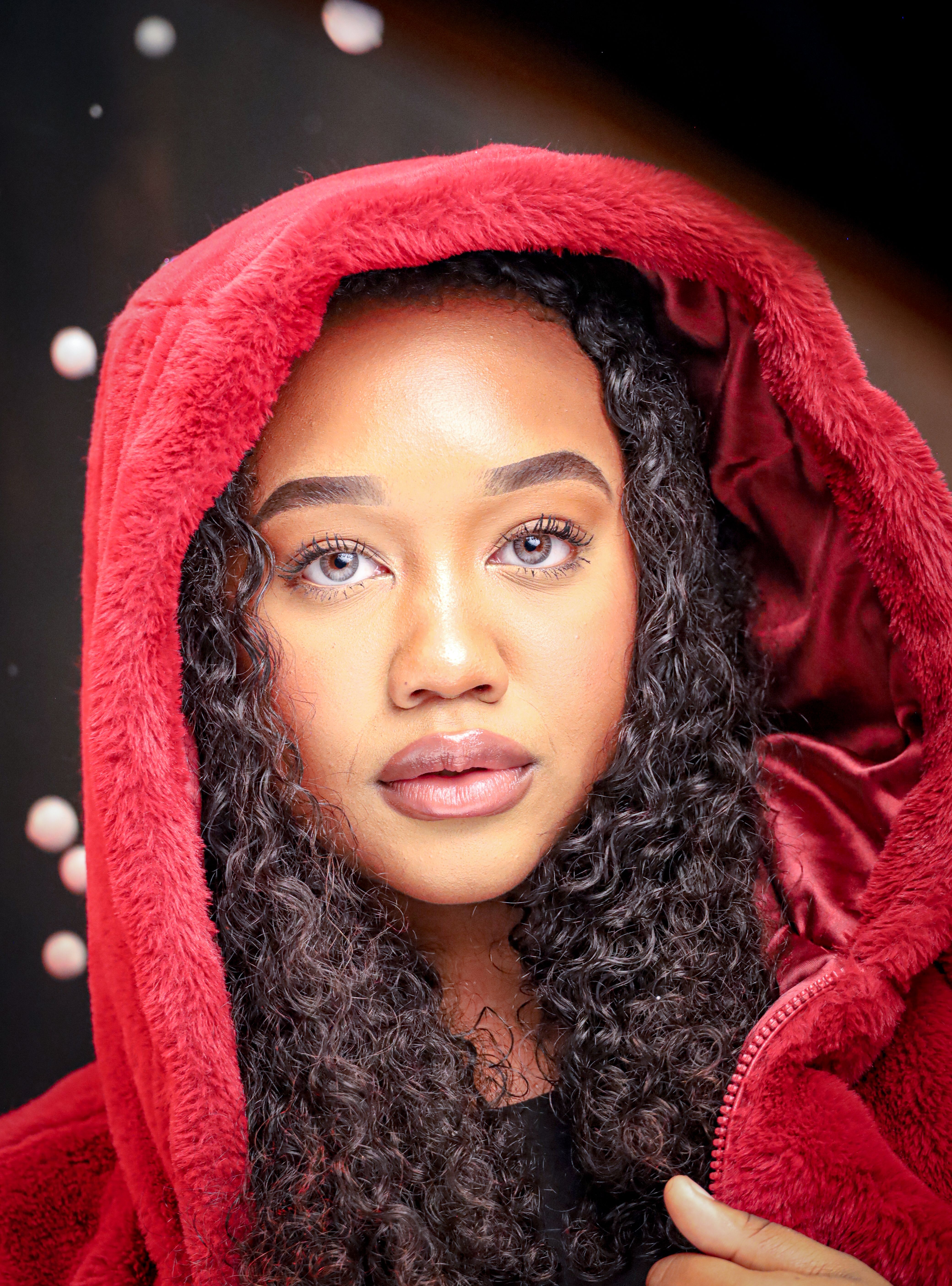 Portrait of Woman in Red Hooded Coat · Free Stock Photo