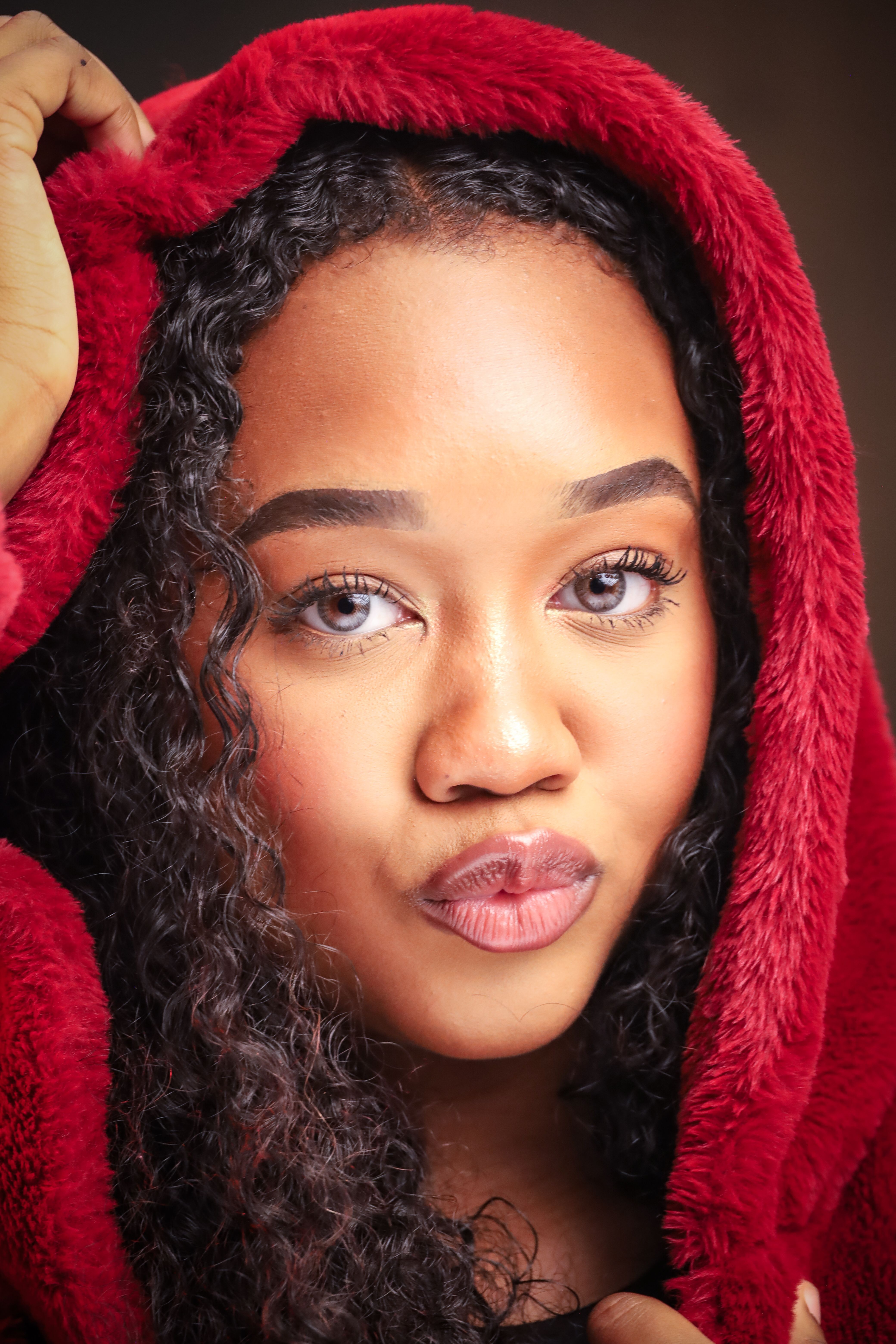 Portrait of Woman in Red Hooded Jacket · Free Stock Photo